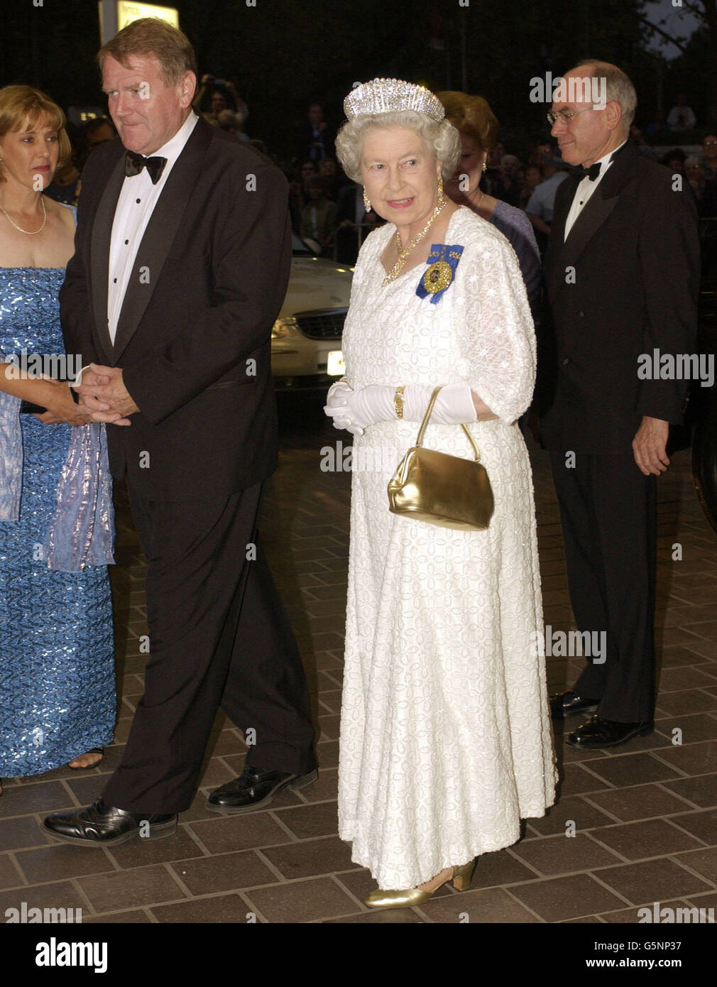 Britain's Queen Elizabeth II is accompanied by Caretaker Premiere Rob ...