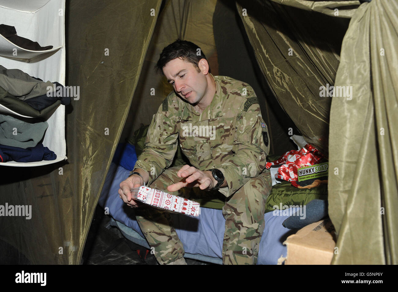 MSST Sergeant Rob Pugh from Shropshire opens Christmas presents in his ...