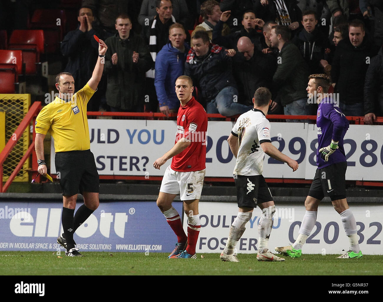 Charlton Athletic's Michael Morrison gets a red card from Referee Carl ...