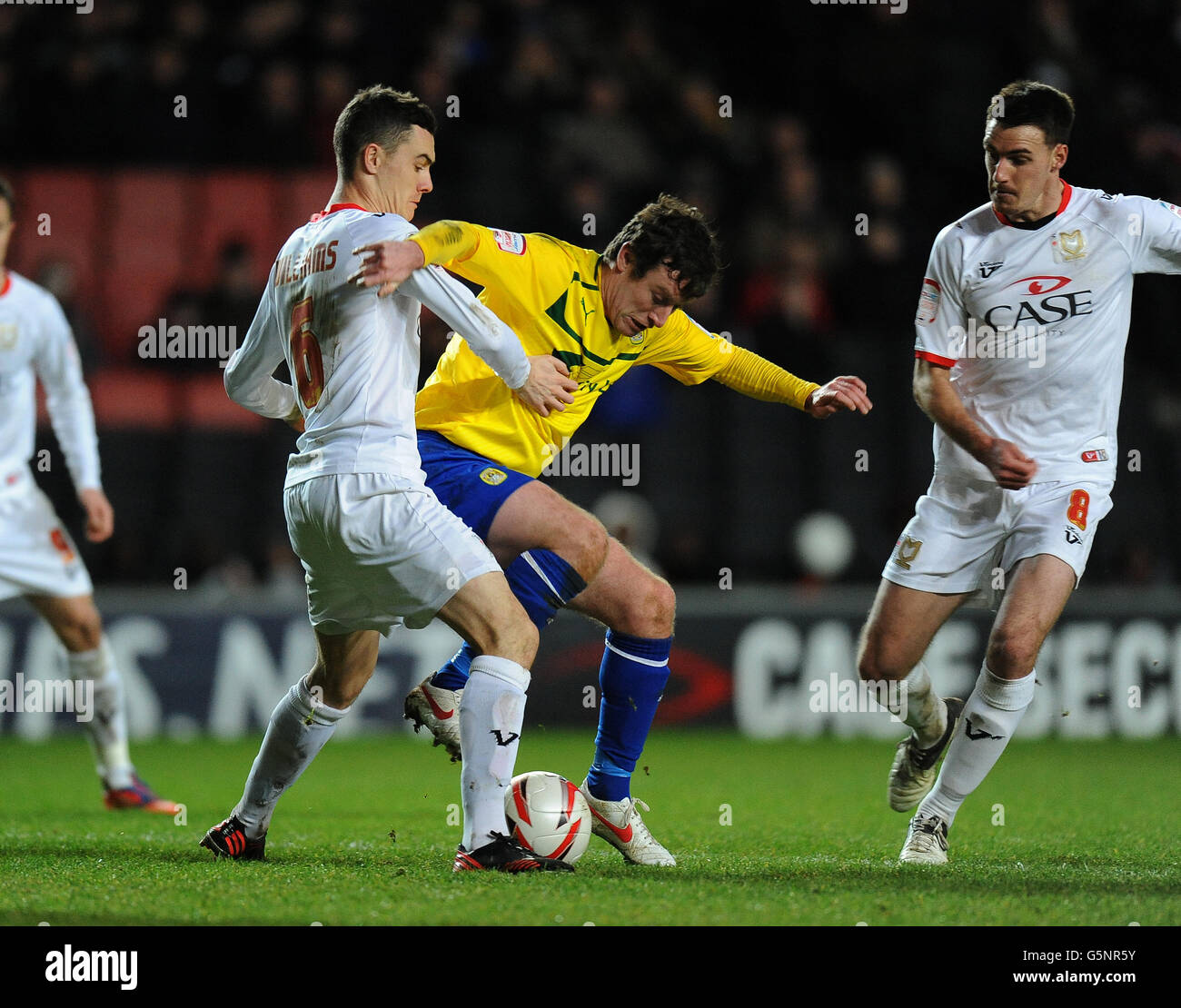 Milton Keynes Dons' Shaun Williams and Coventry City's Stephen Elliott ...