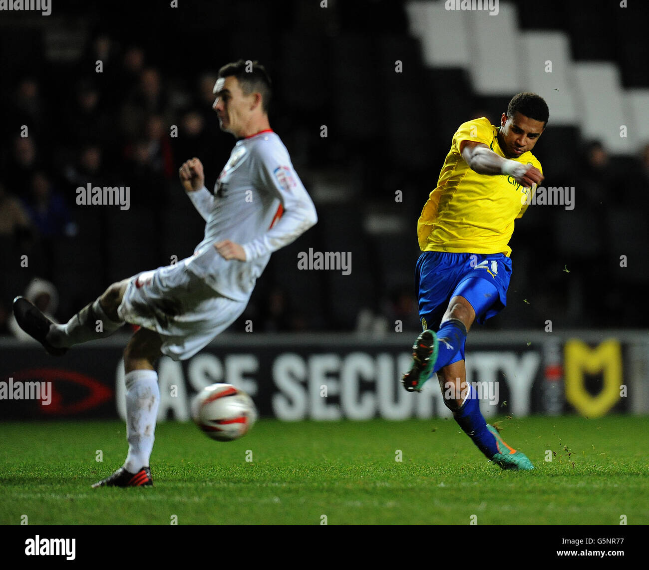 Milton Keynes Dons' Shaun Williams avoids Coventry City's Cyrus ...