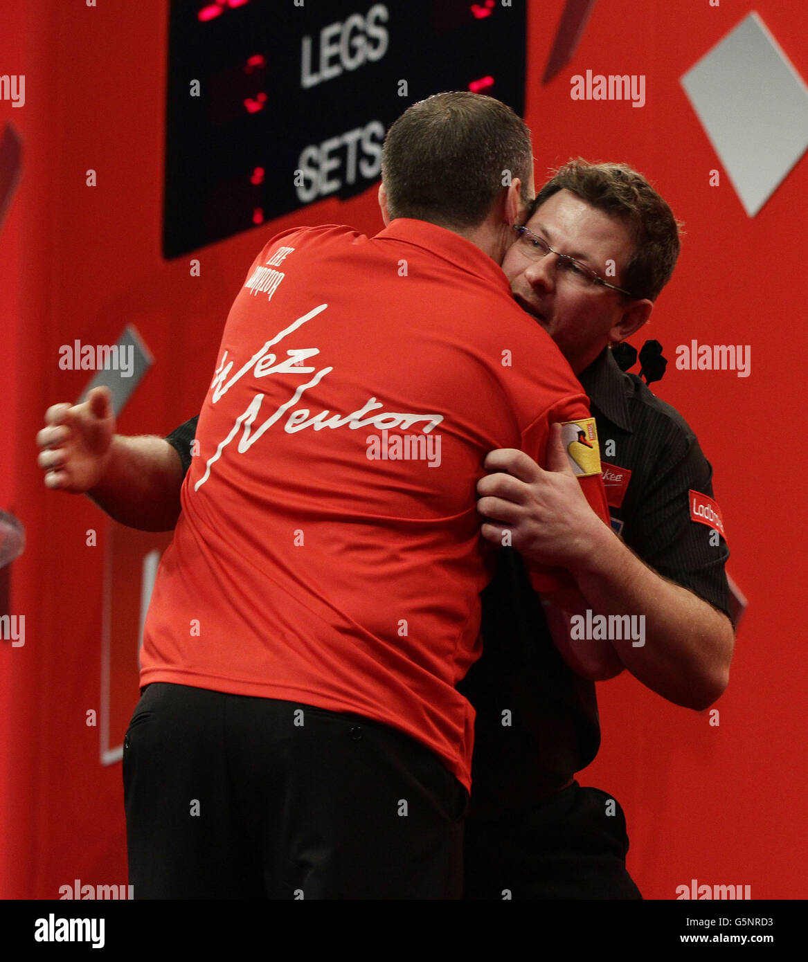 James Wade (right) celebrates victory after his quarter-final match ...