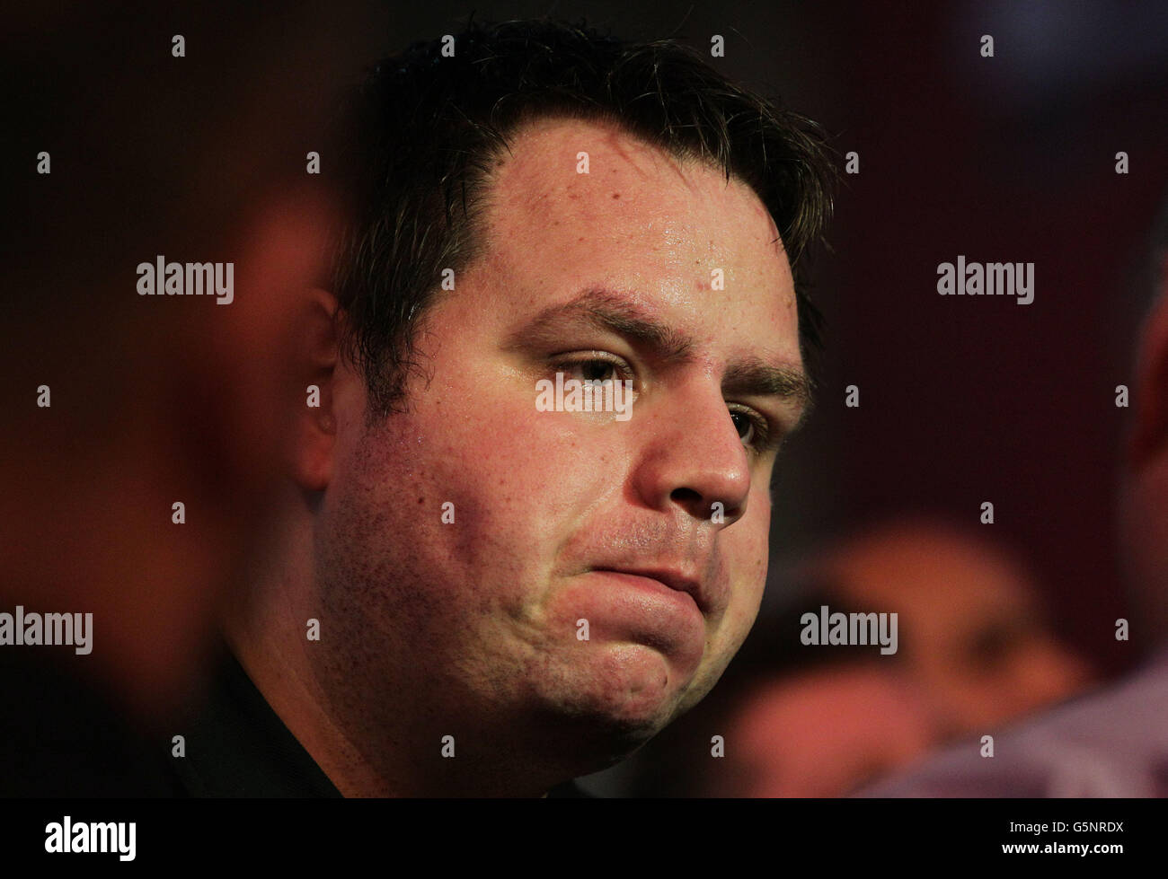 Defending champion Adrian Lewis gives an interview to media after ...