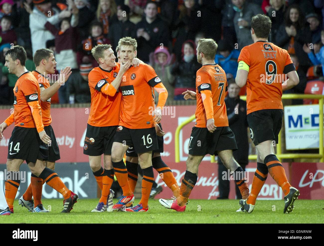 Dundee United's Stuart Armstrong celebrates scoring with team-mates ...