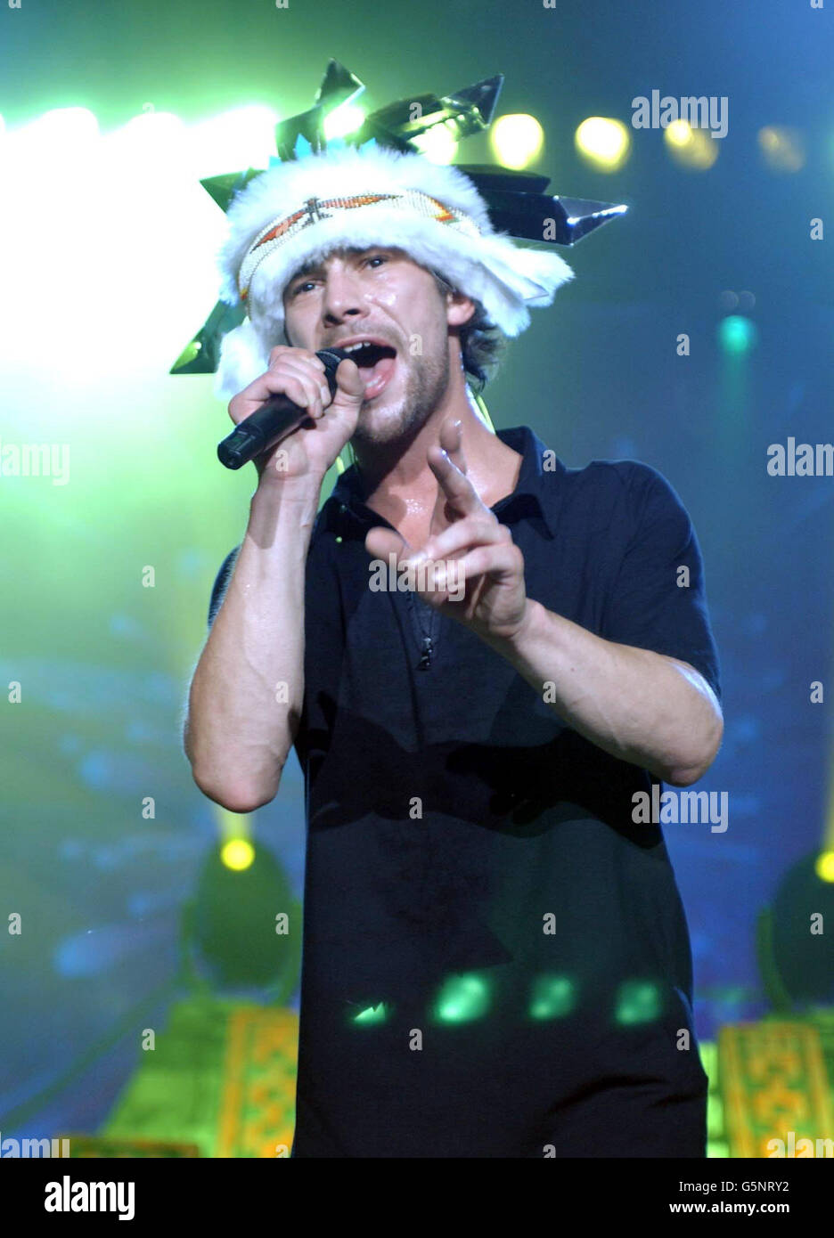 Jamiroquai frontman Jay Kay performing on stage at London's Wembley ...