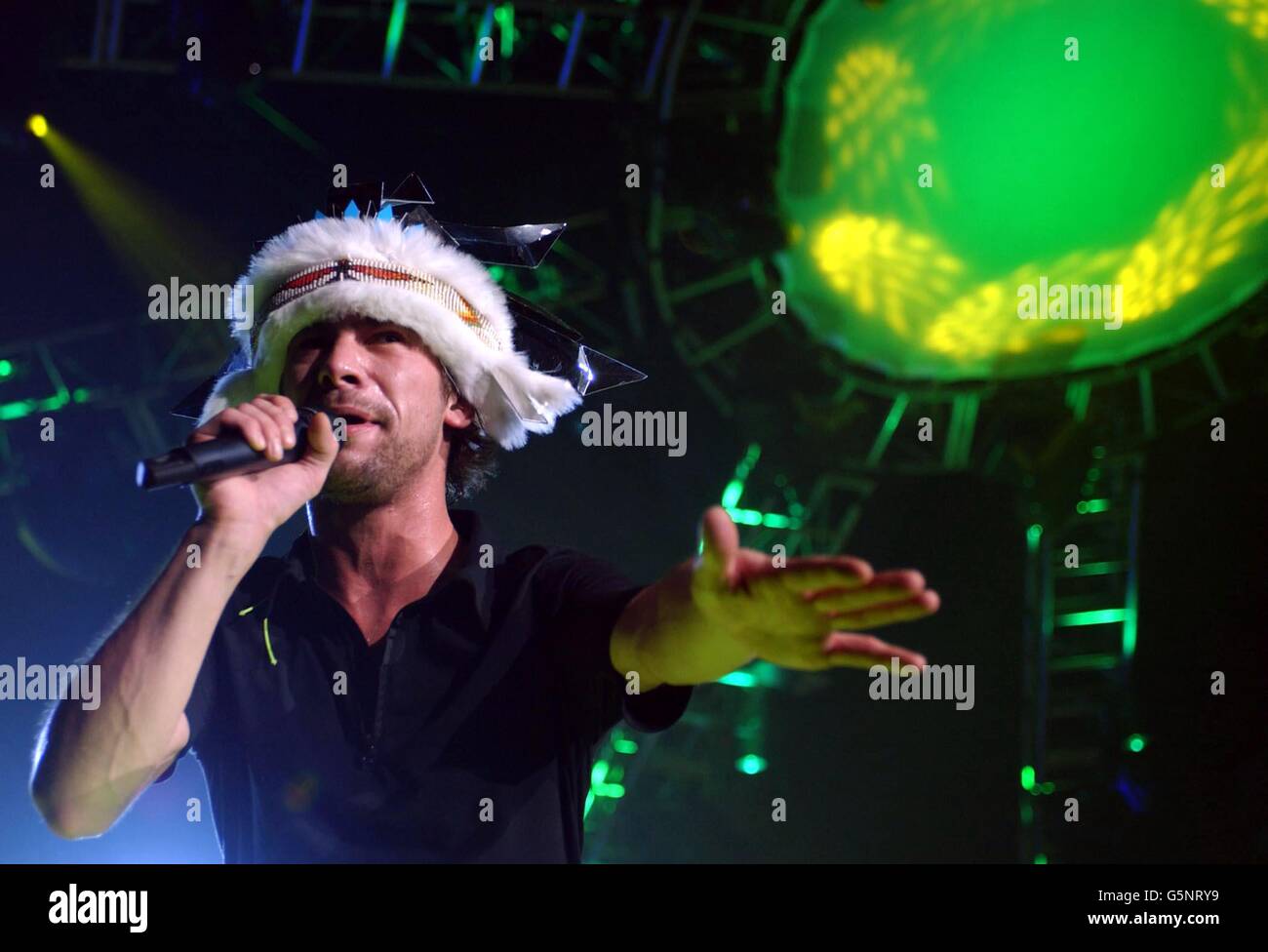 Jamiroquai frontman Jay Kay performing on stage at London's Wembley ...