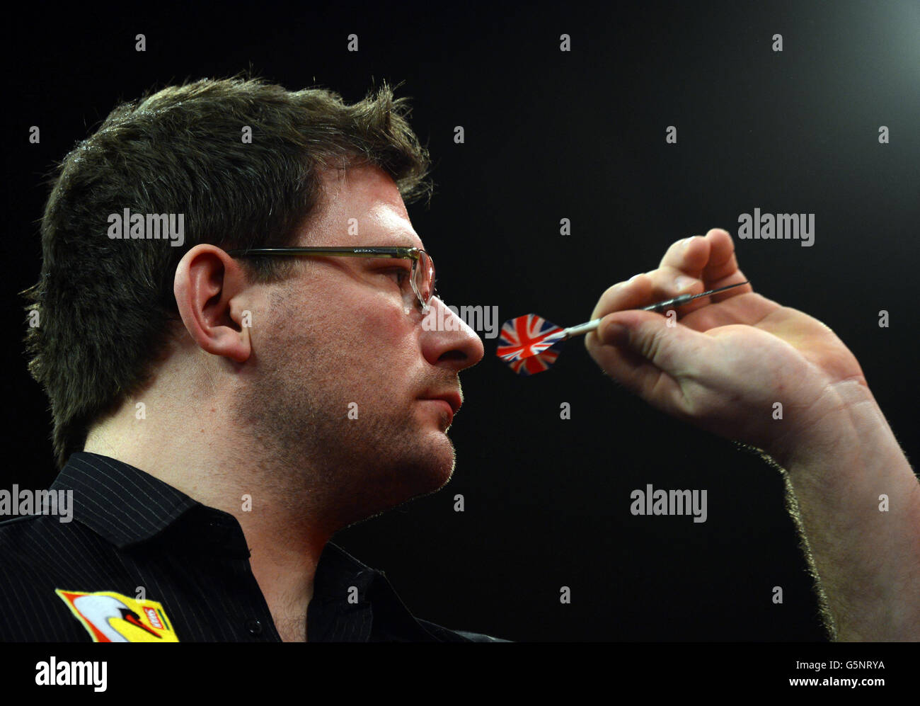 James Wade in action during the Ladbrokes.com World Darts Championship ...
