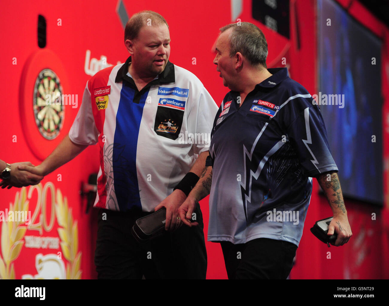 Phil Taylor and Raymond van Barneveld continue arguing after their ...