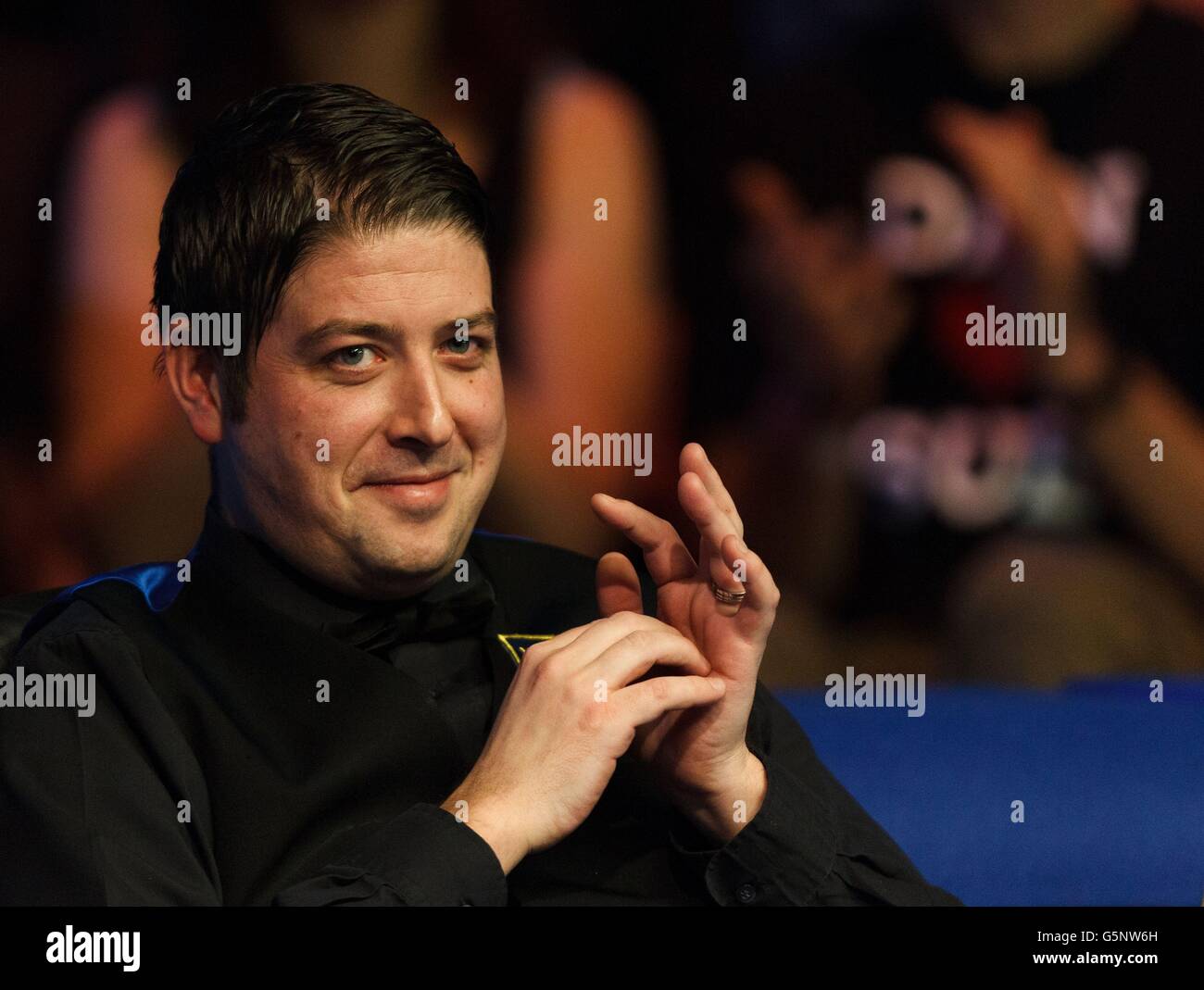 Matthew Stevens waits in the seat in his match against Mark Davis ...