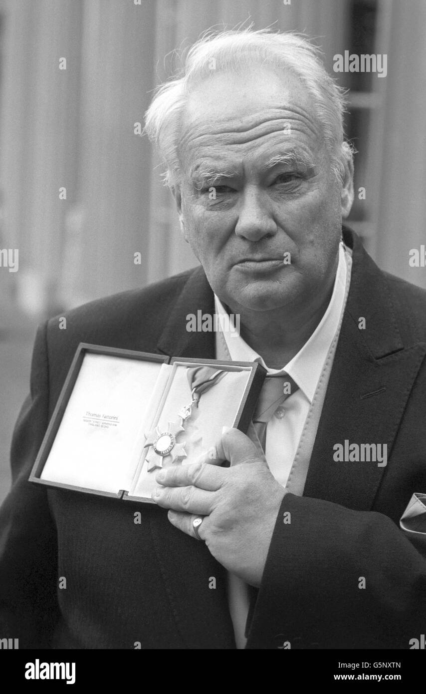 TV astronomer Patrick Moore after receiving a CBE from the Queen at ...