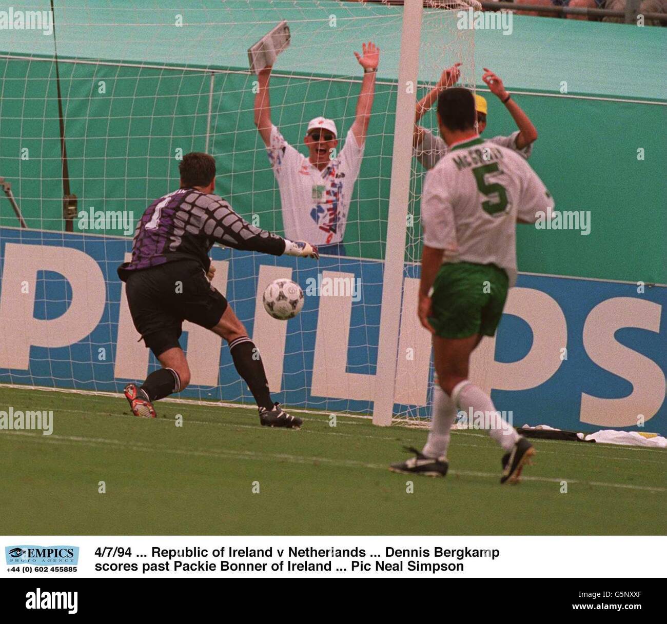 Dennis bergkamp score past packie bonner ireland hi-res stock ...
