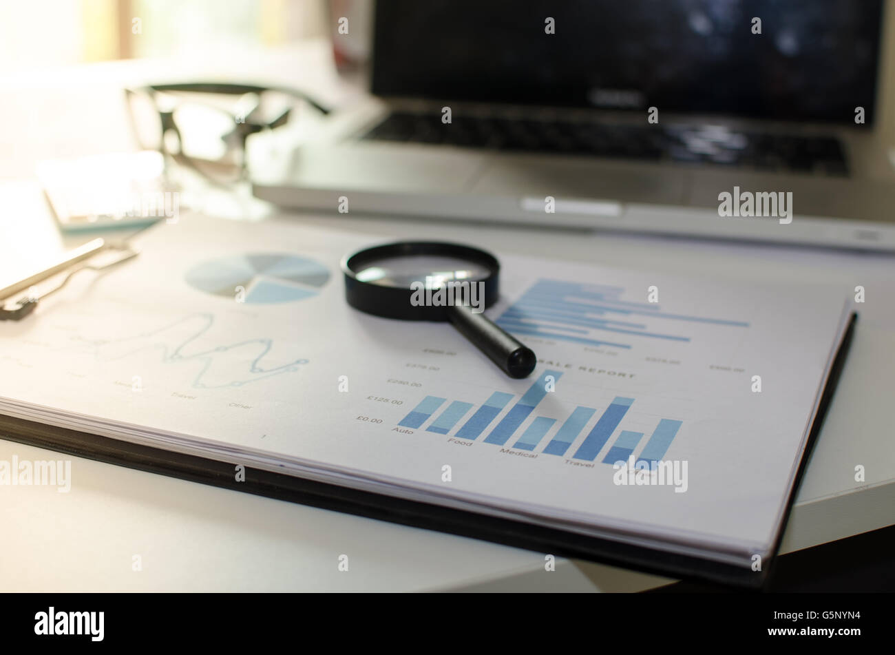 Financial chart magnifying glass hi-res stock photography and images ...