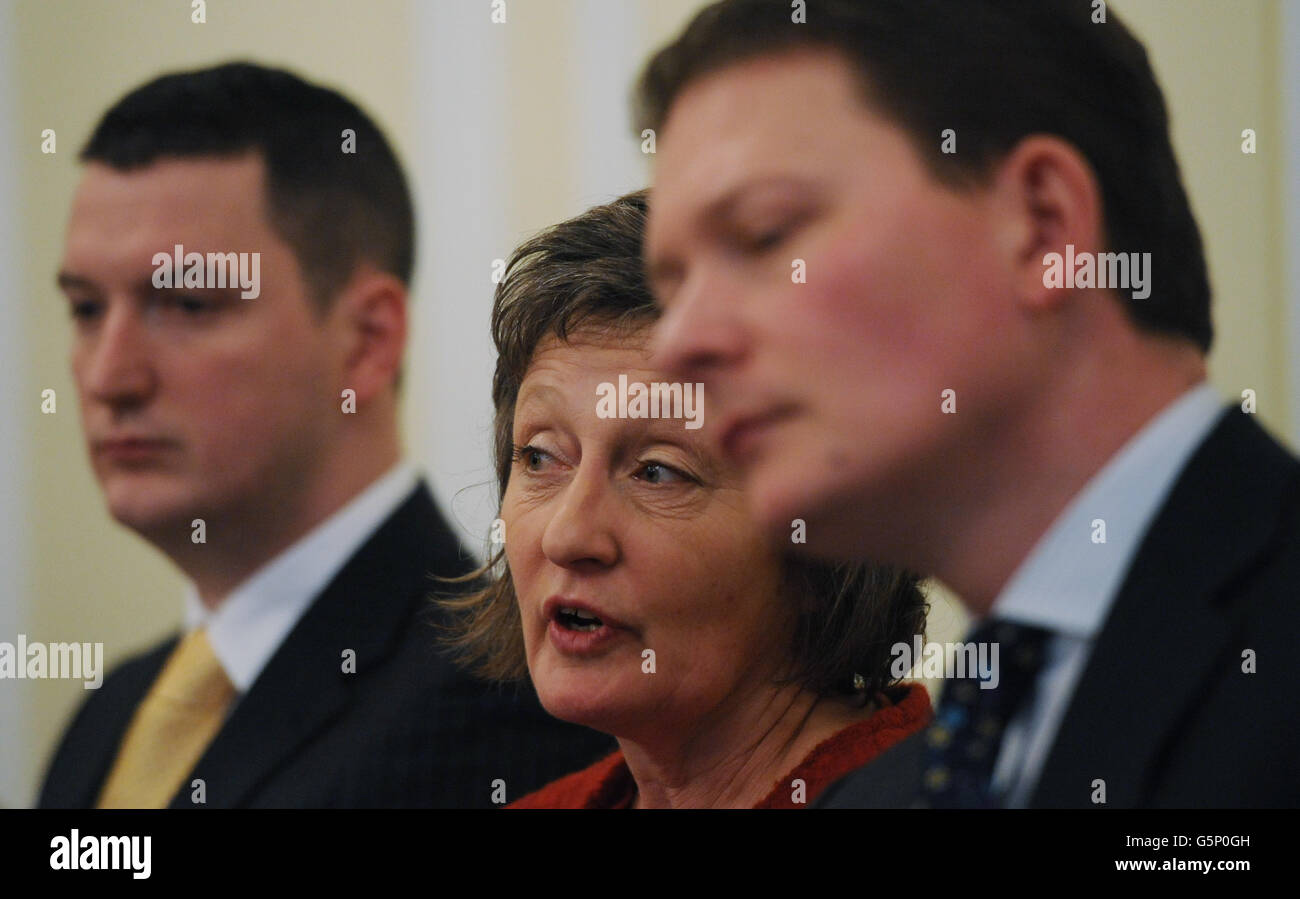 Geraldine Finucane (centre) and her two sons Michael (right), and John ...