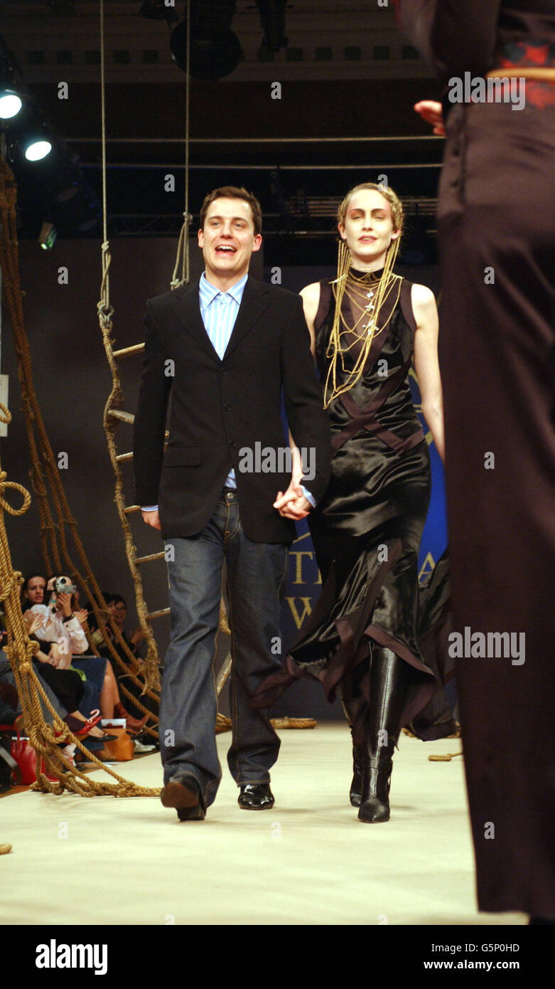 A model joins Tristan Webber's on the runway at his Autumn/Winter ...