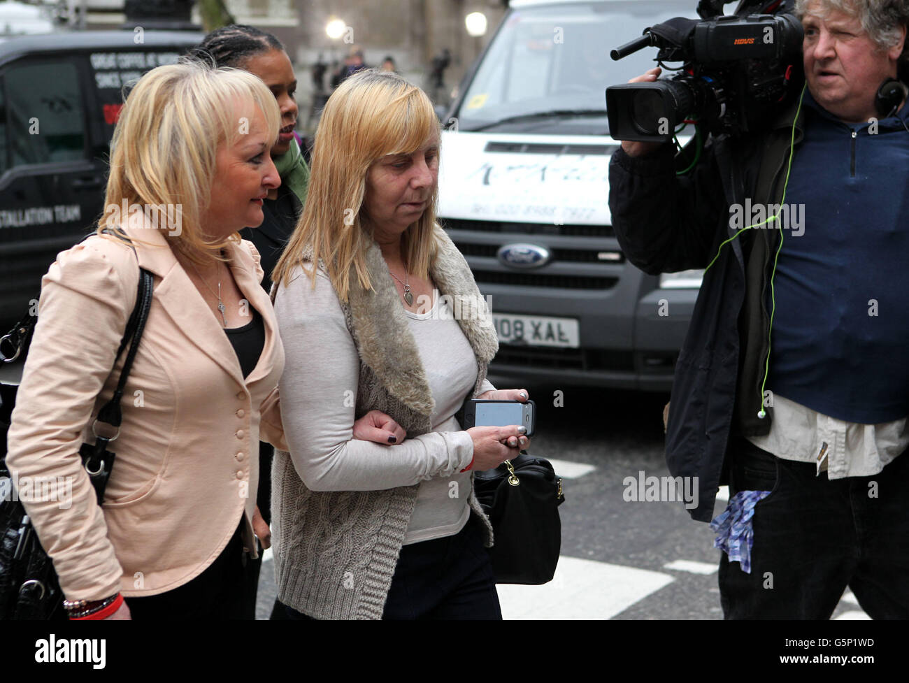 Jenny Hicks (left) and Margaret Aspinall (right) arrive at the High ...