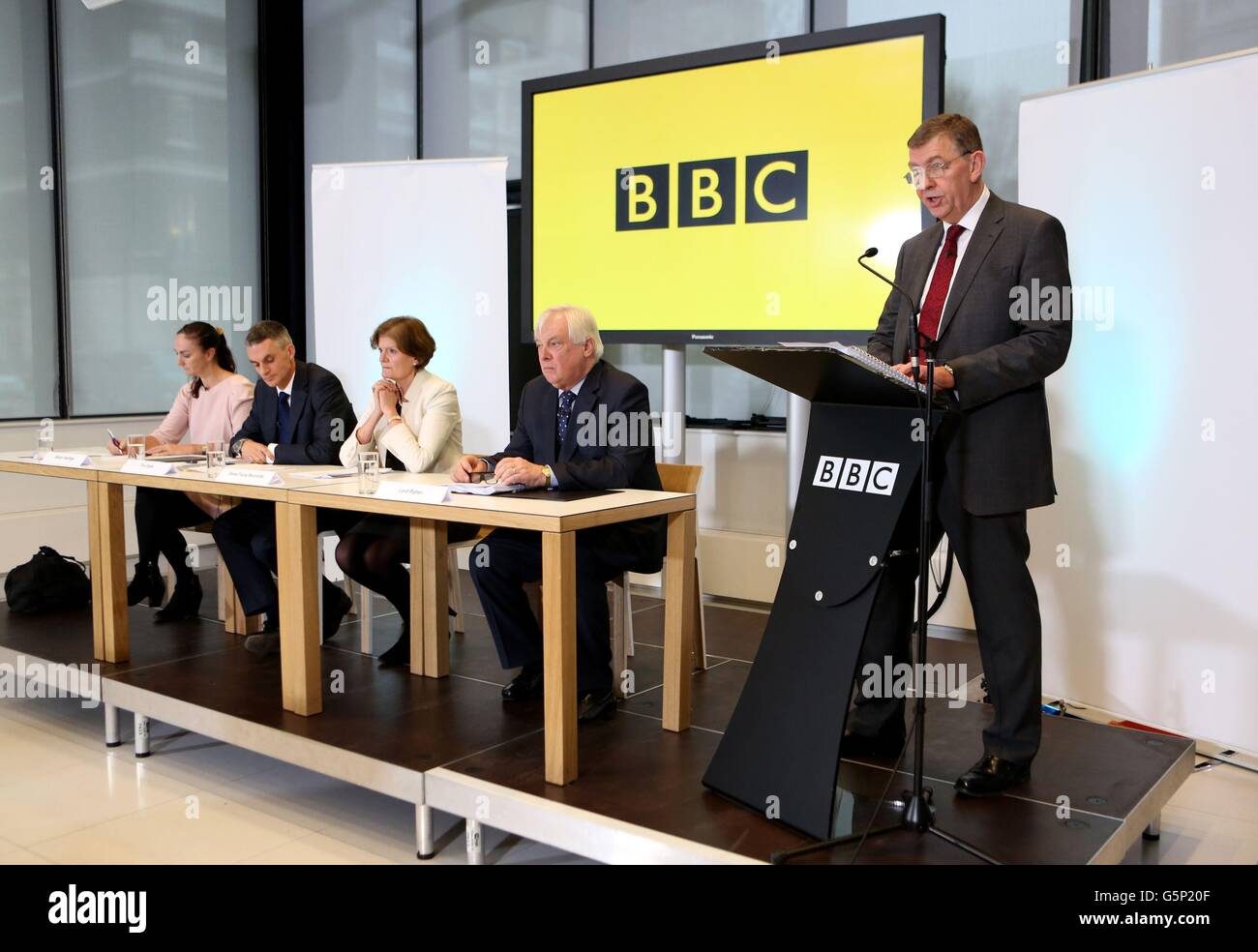 Nick Pollard (right), speaks during a press conference at BBC New ...