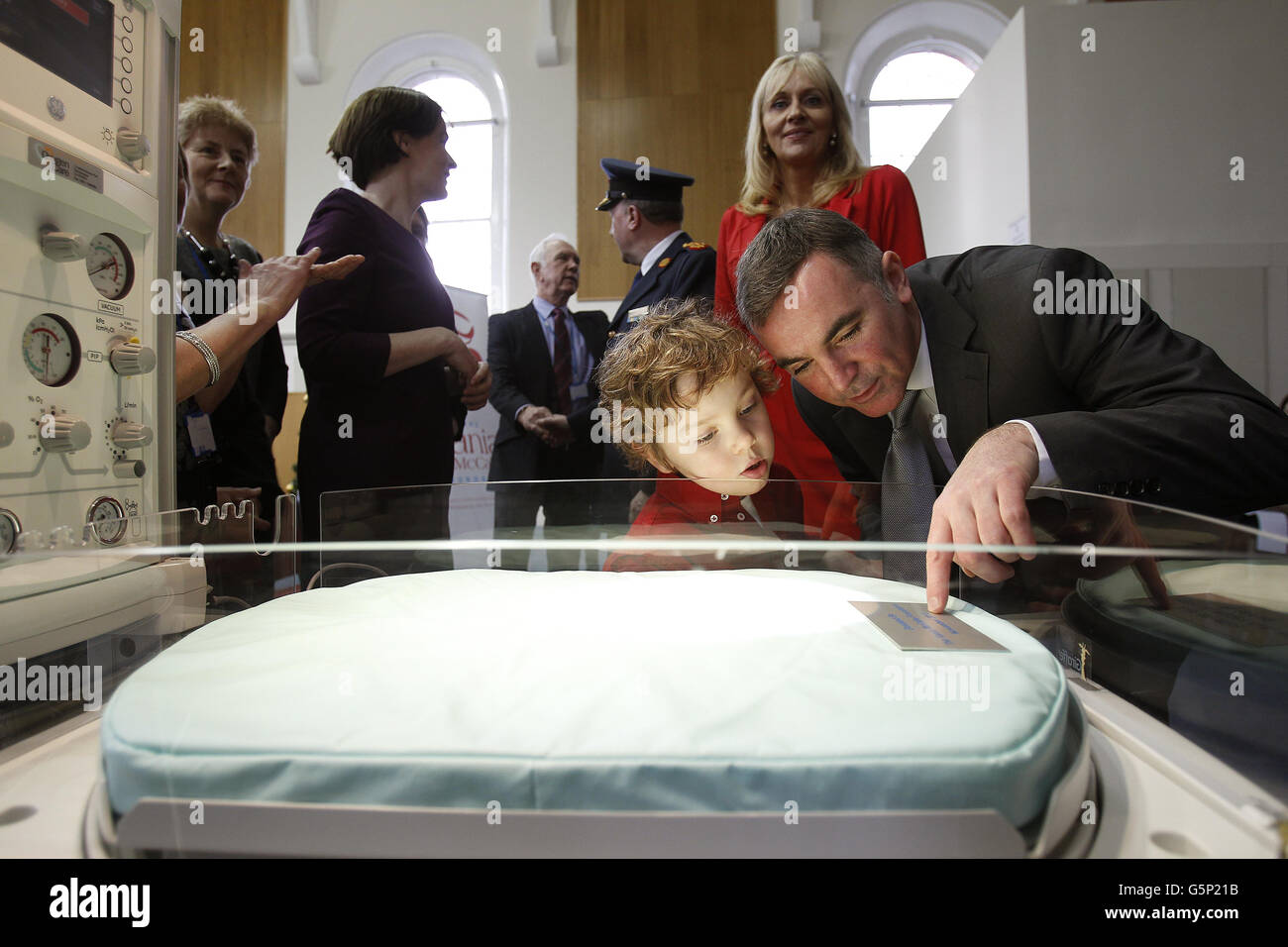 Adam McCabe (5) and his father Aidan ,widow of the late Garda Tania ...