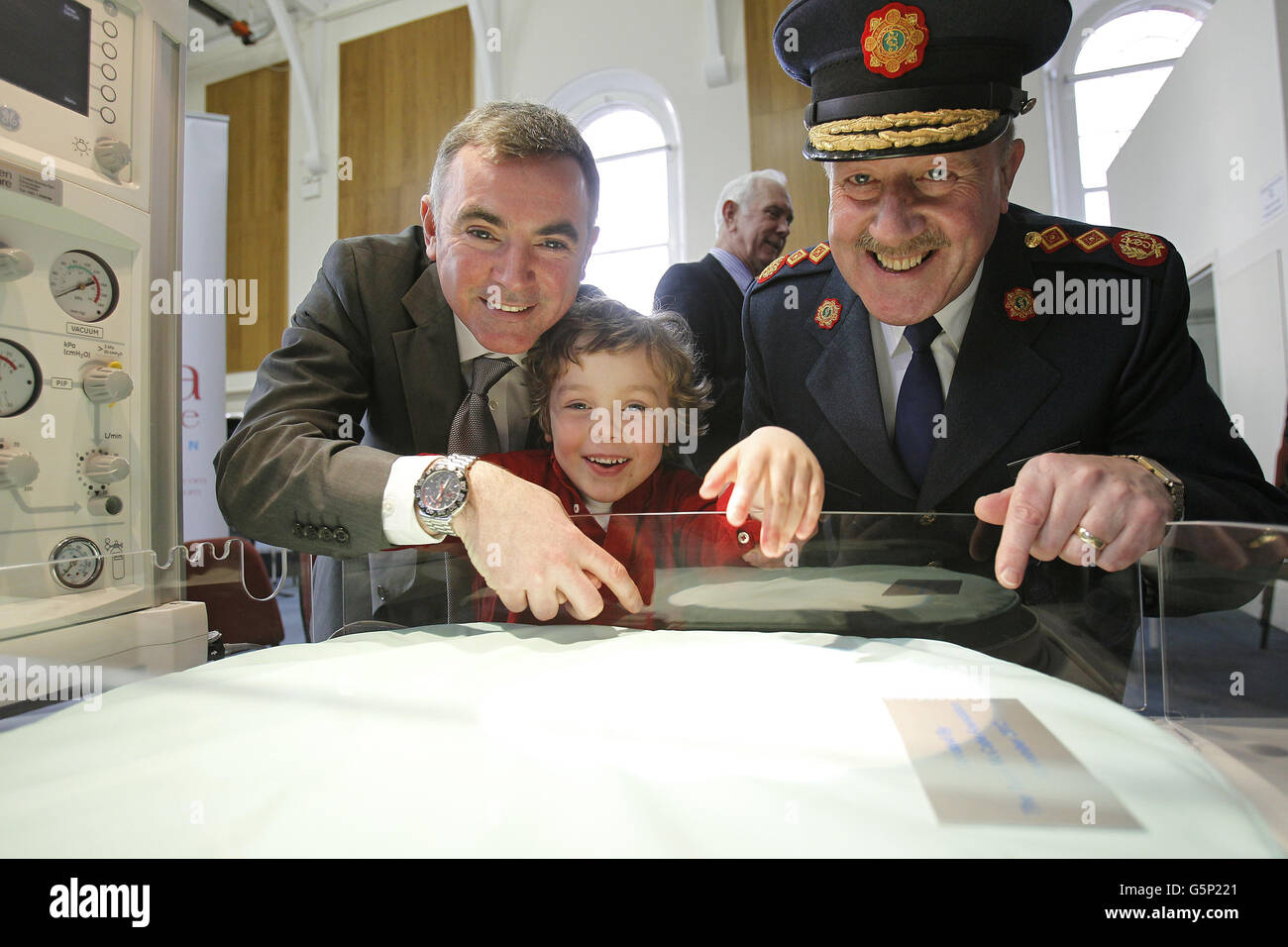 Adam McCabe (5) and his father Aidan ,widow of the late Garda Tania McCabe with Garda ...