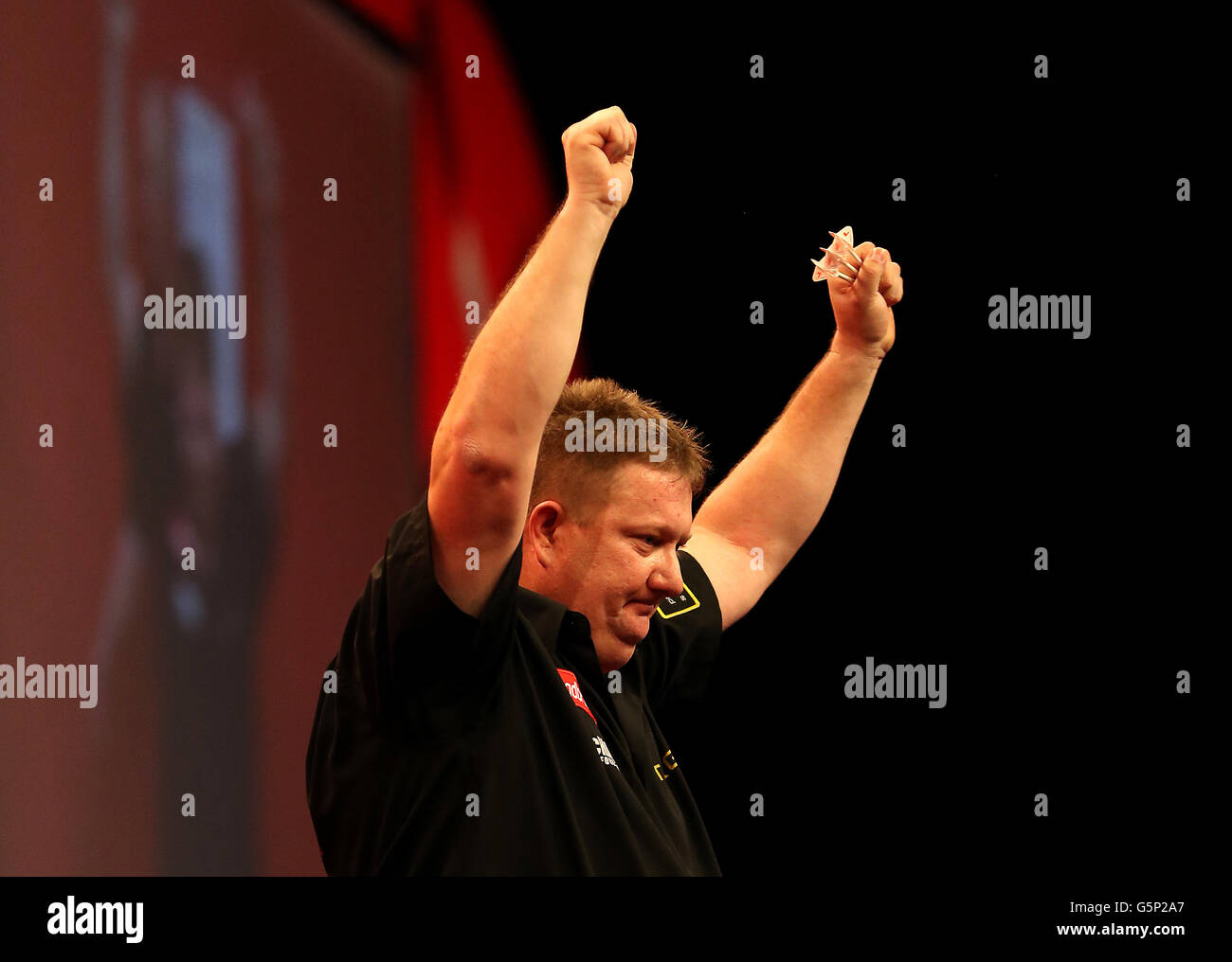 Colin Lloyd celebrates victory over Darin Young during the Ladbrokes ...
