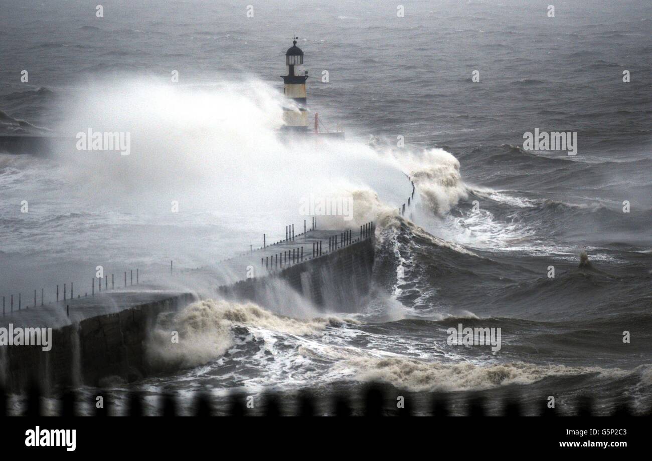 Waves crash into the sea wall at Seaham Harbour as parts of the UK are ...