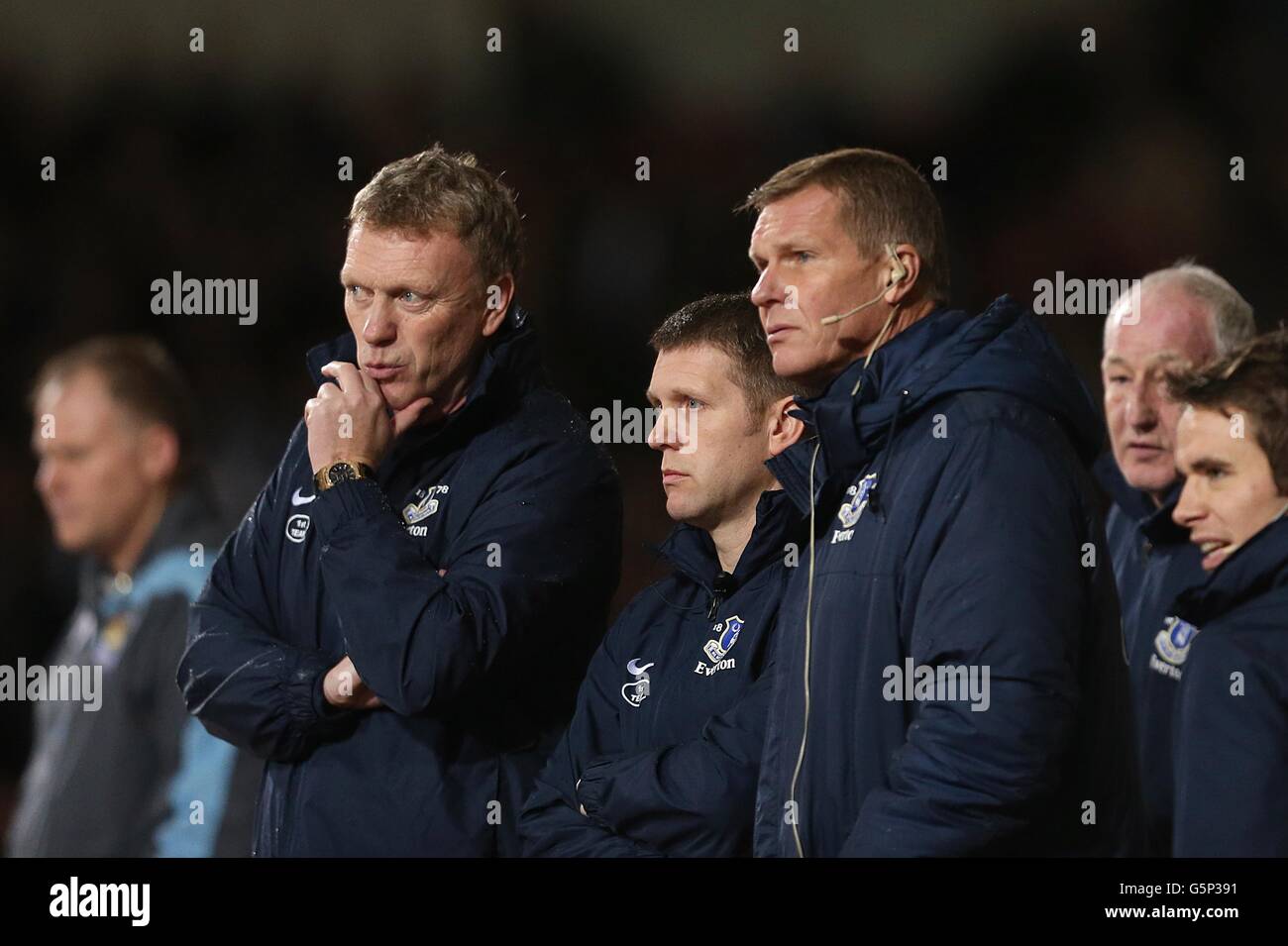Everton manager David Moyes (second left) talks tactics with his ...
