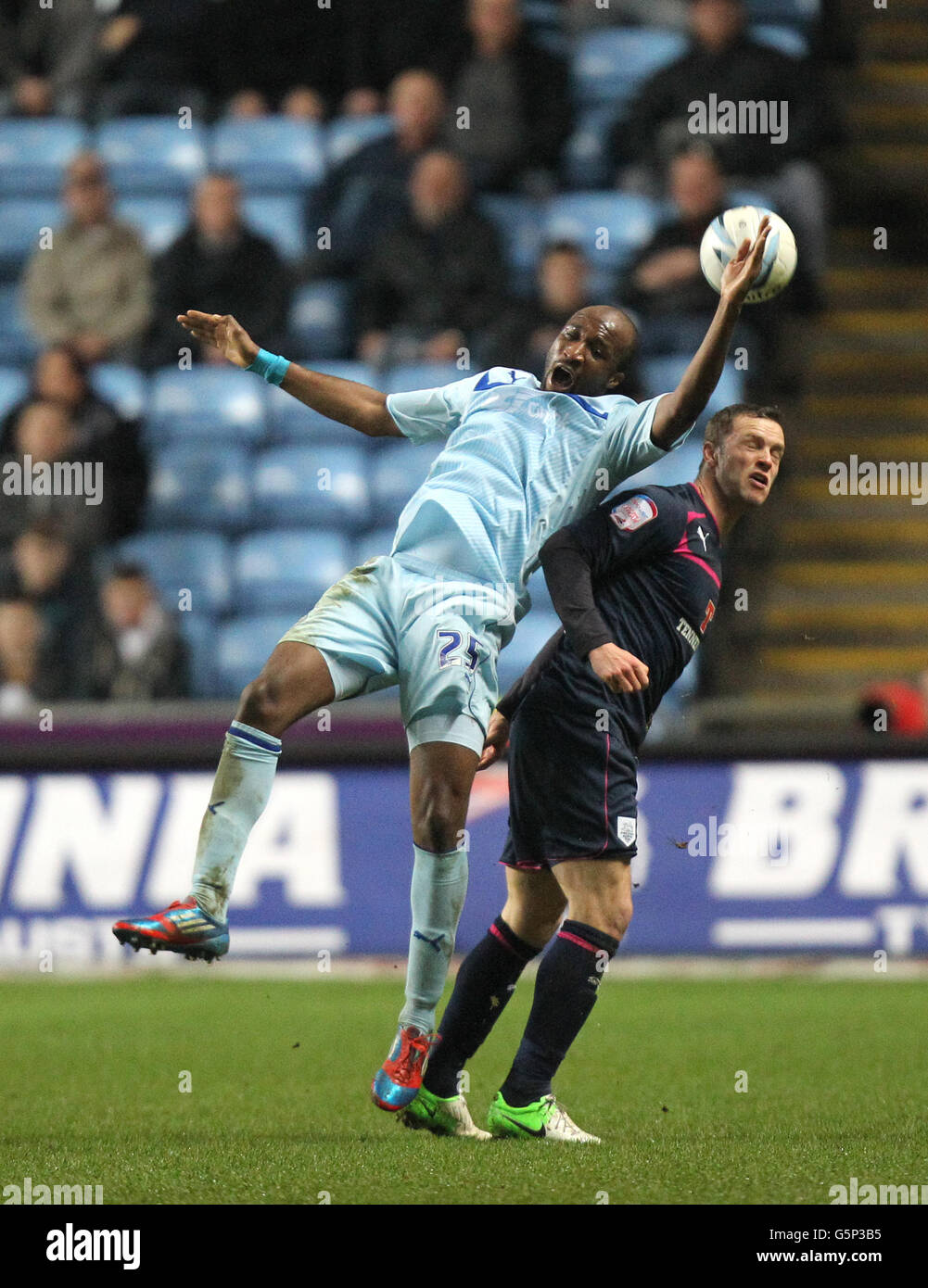 Coventry City's William Edjenguele and Preston North End's Chris ...