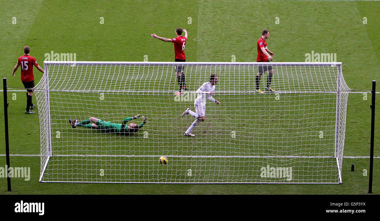 Swansea City's Miguel Michu (second right) scores his team's opening ...