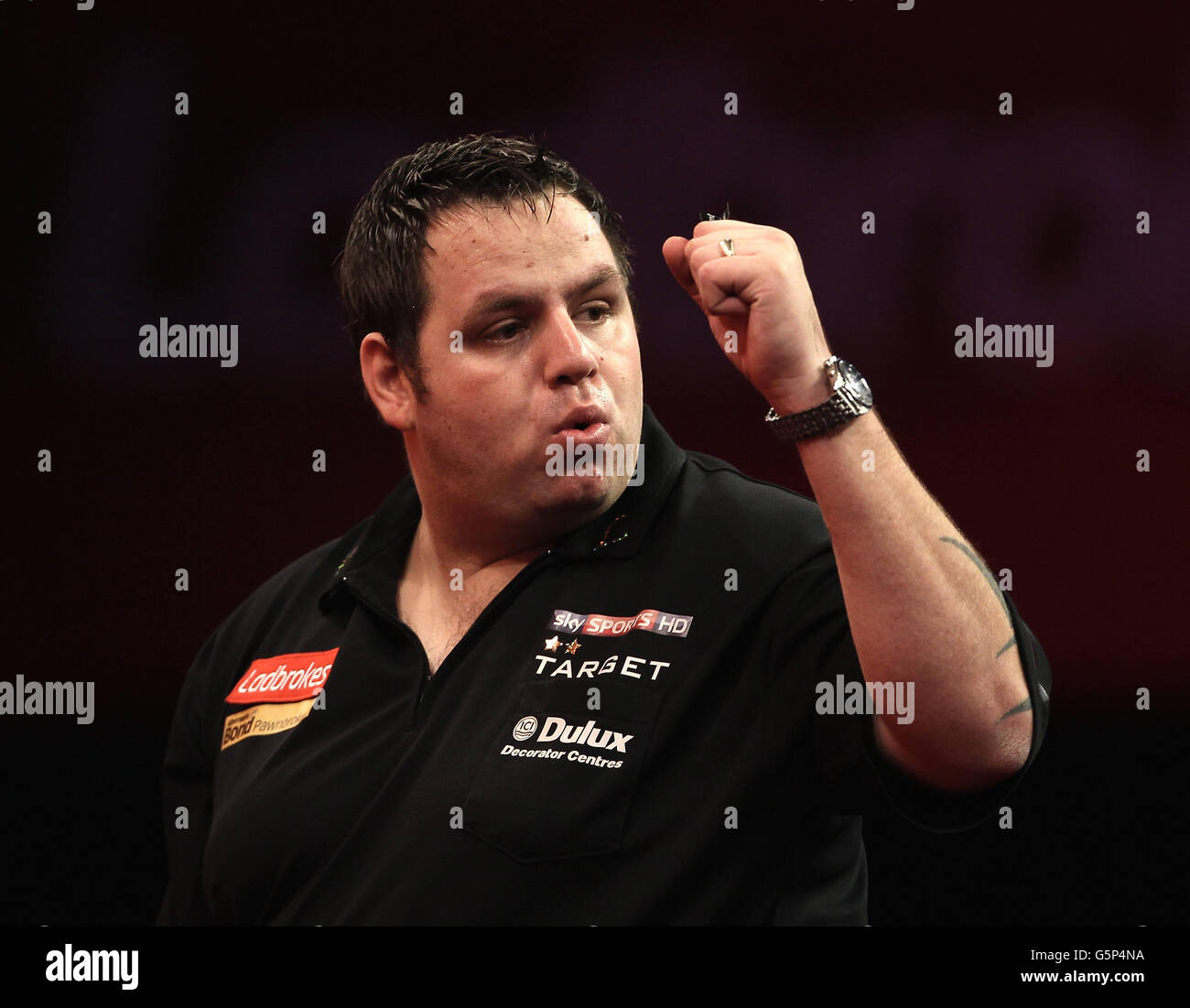 Adrian Lewis celebrates in his match against Kevin Painter during the ...