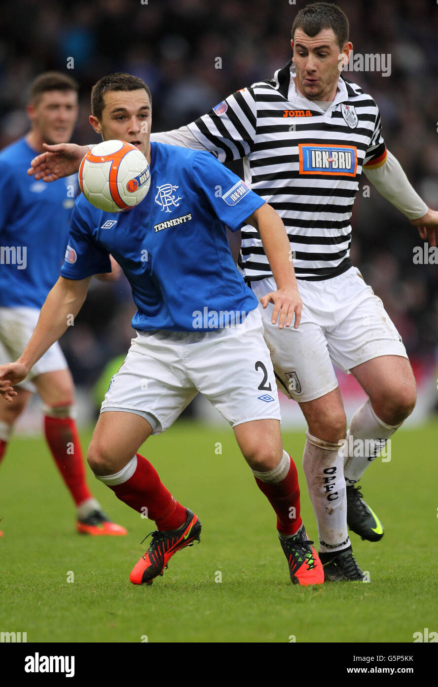Ranger's Chris Hegarty and Queens Parks Anthony Quinn during the Irn ...