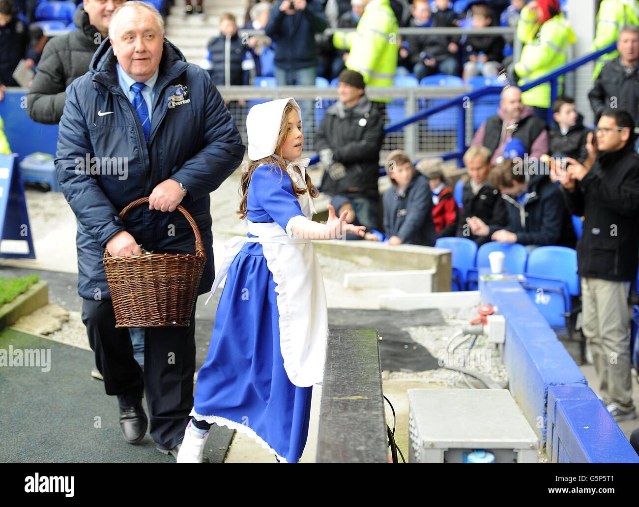 The Toffee Lady hands out sweets to kids before the game Stock Photo ...