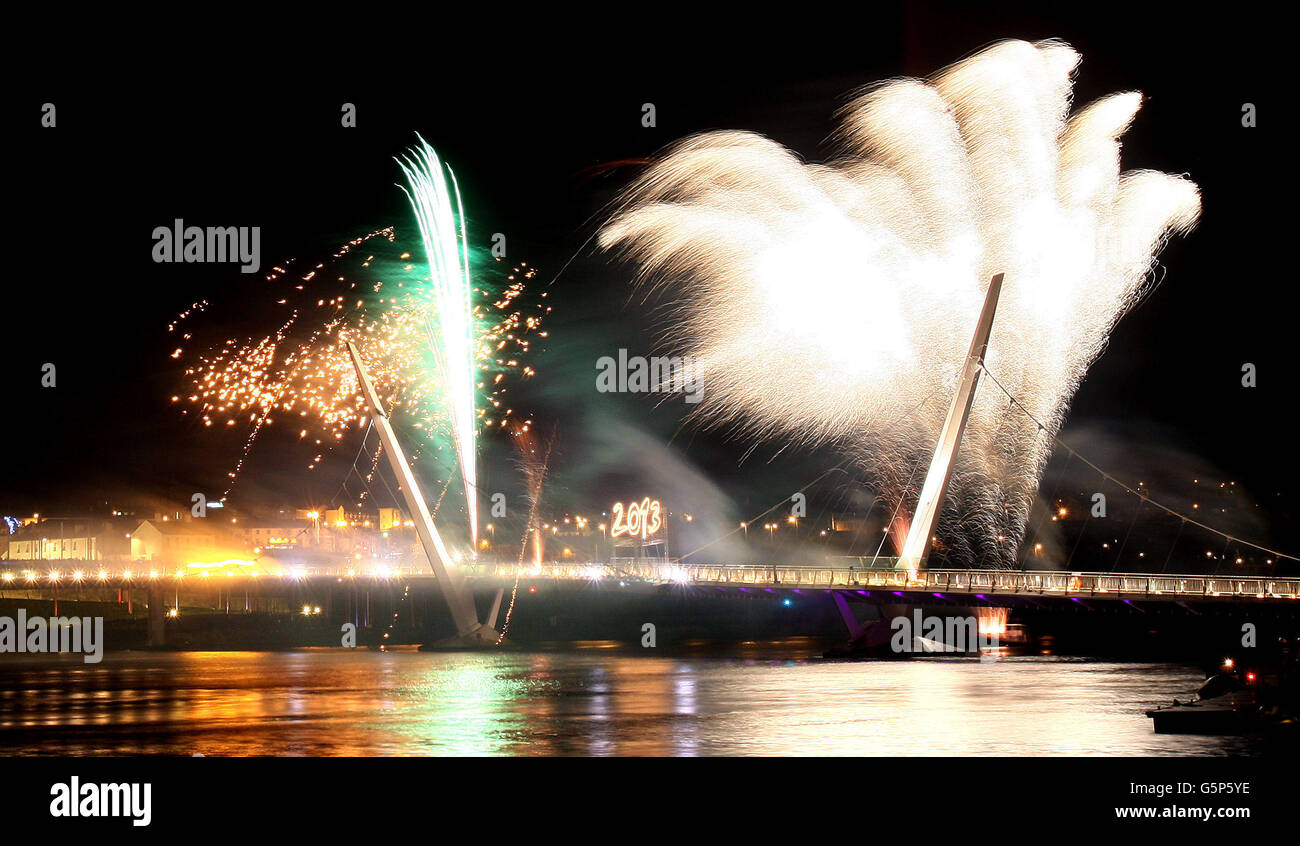 Fireworks over the Peace bridge in Londonderry, as the city celebrates ...