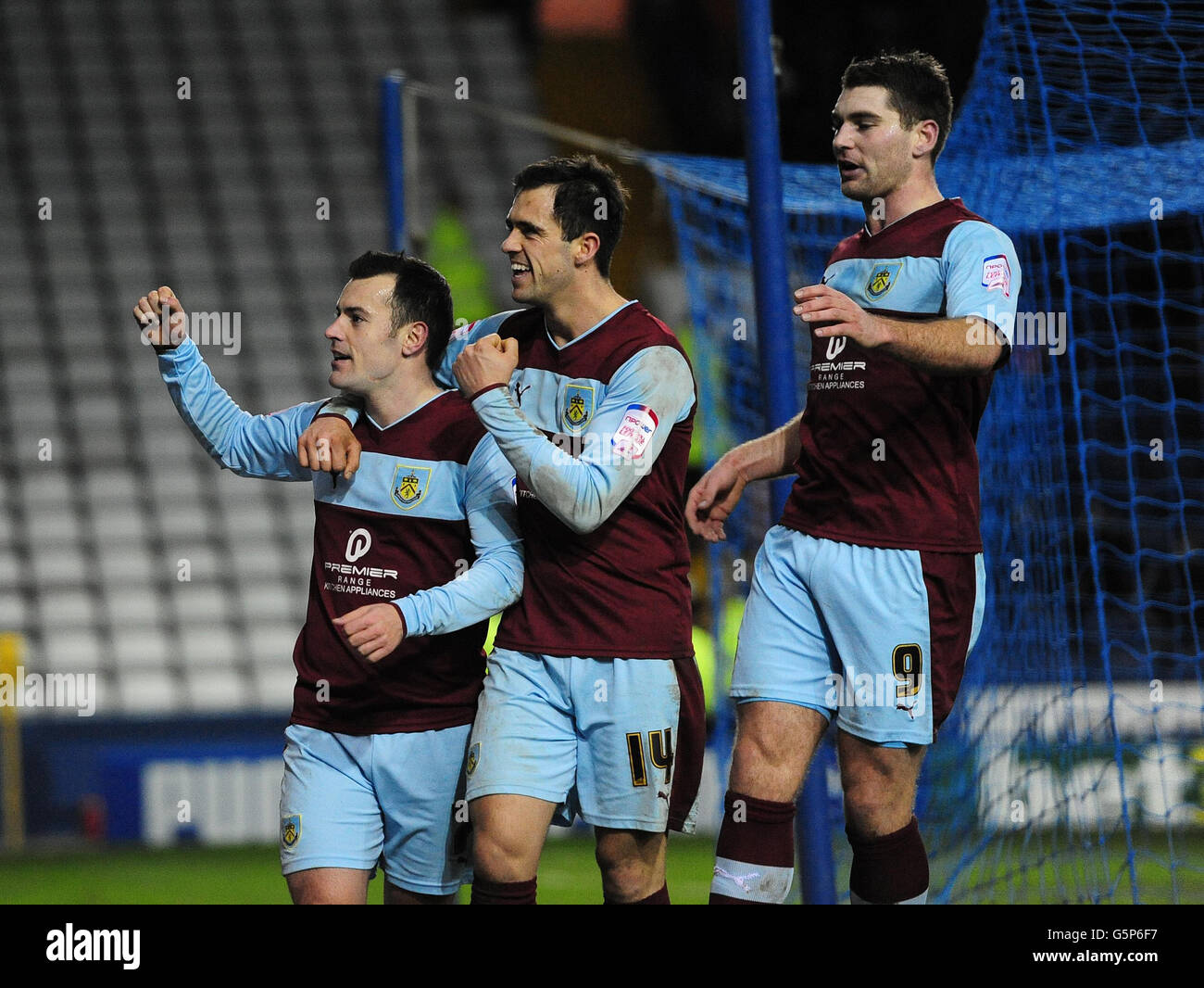 Burnley's Ross Wallace (left) celebrates Danny Ings and Sam Vokes after ...