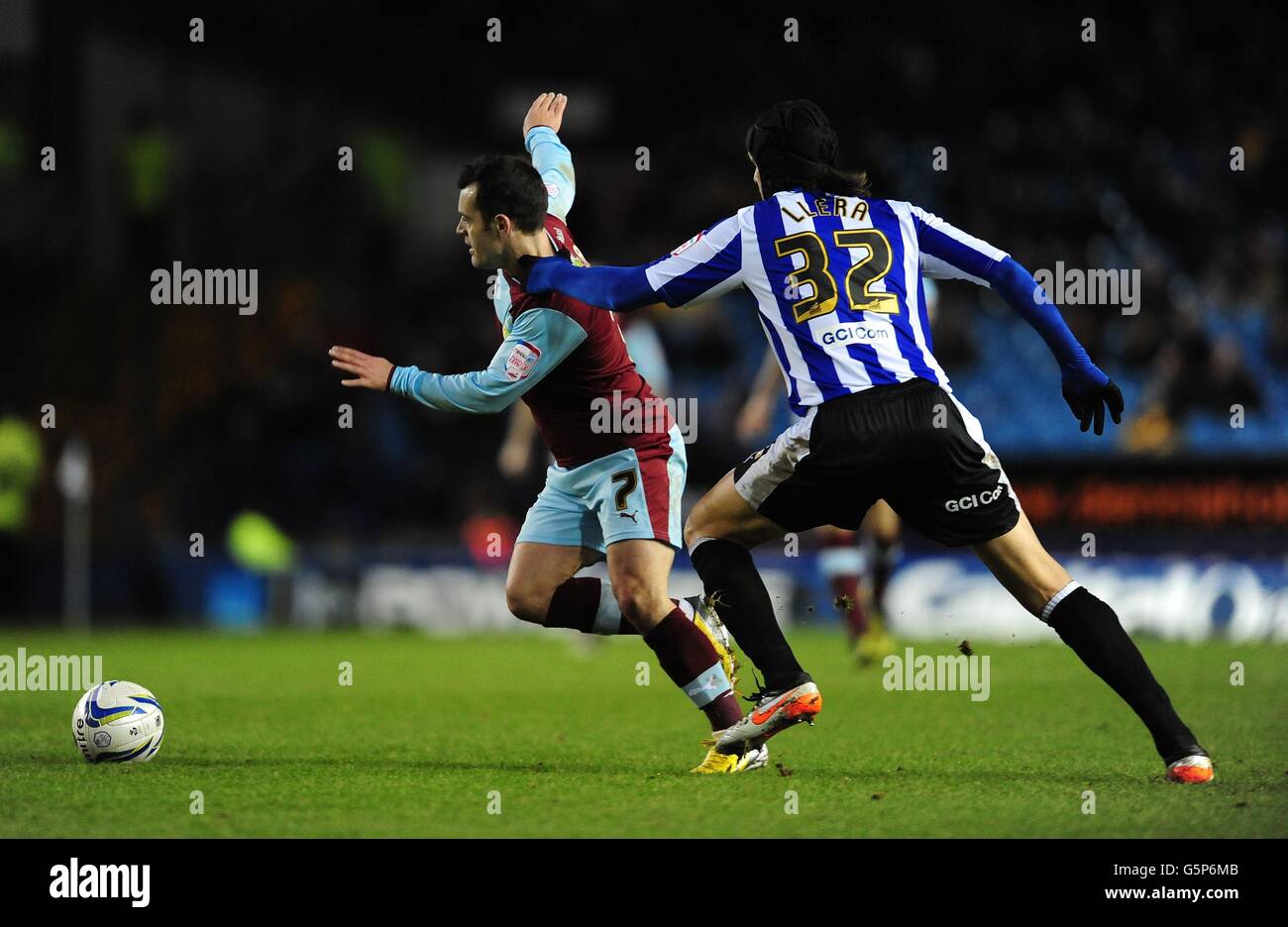 Burnley's Ross Wallace and Sheffield Wednesday's Miguel Llera battle ...