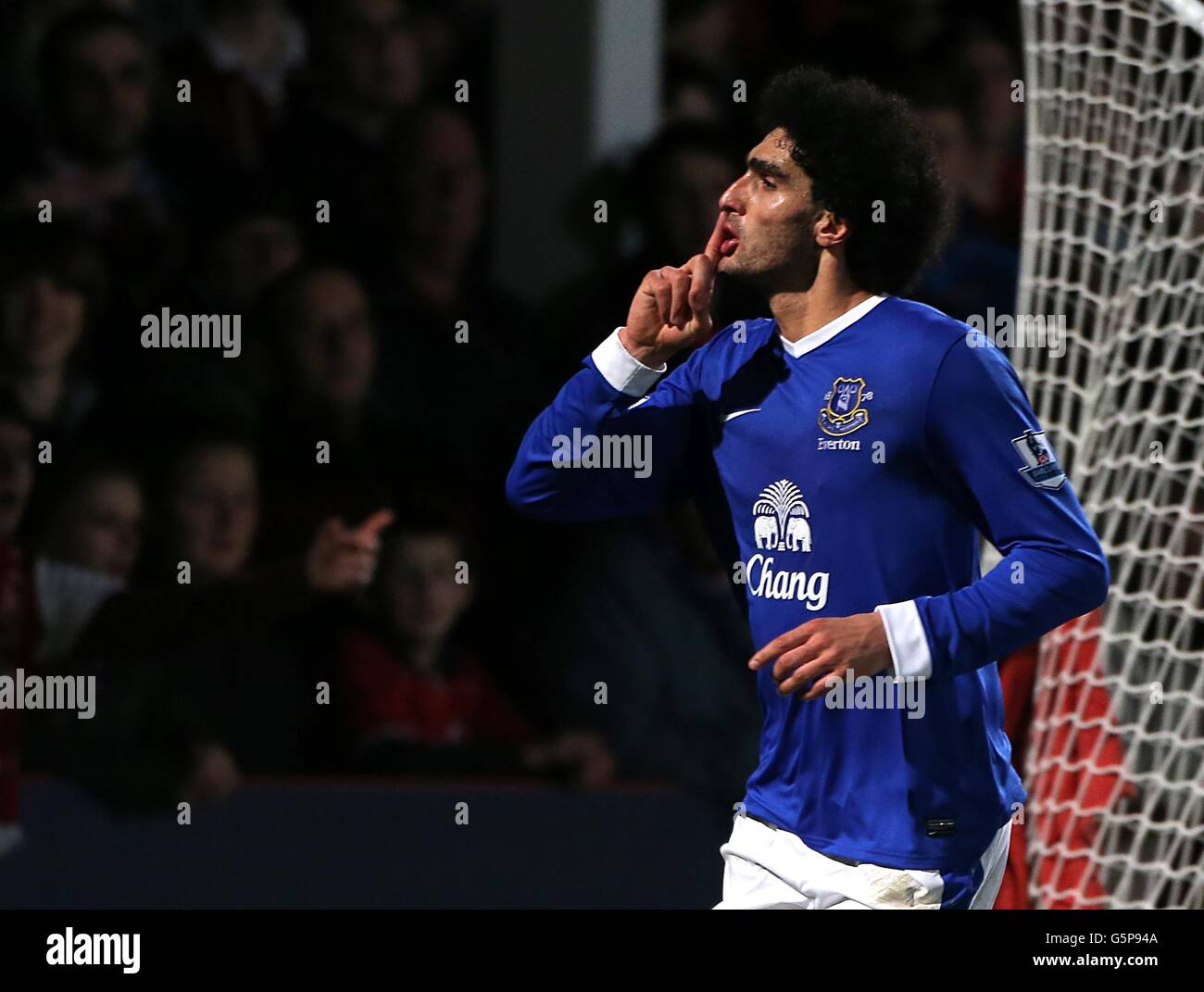 Everton's Marouane Fellaini celebrates scoring his side's fifth goal ...