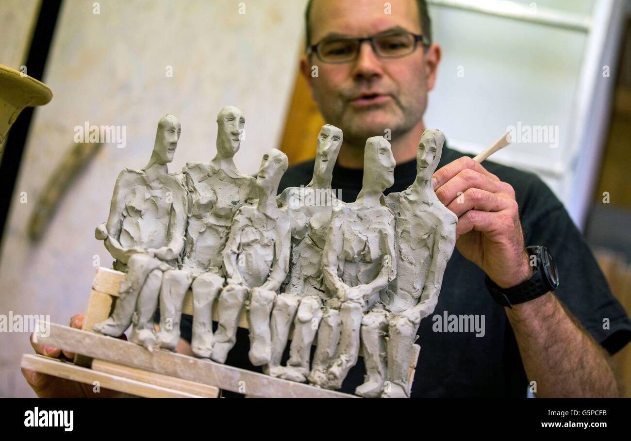 Korswandt, Germany. 18th June, 2016. Daniel Graf works on figures made ...