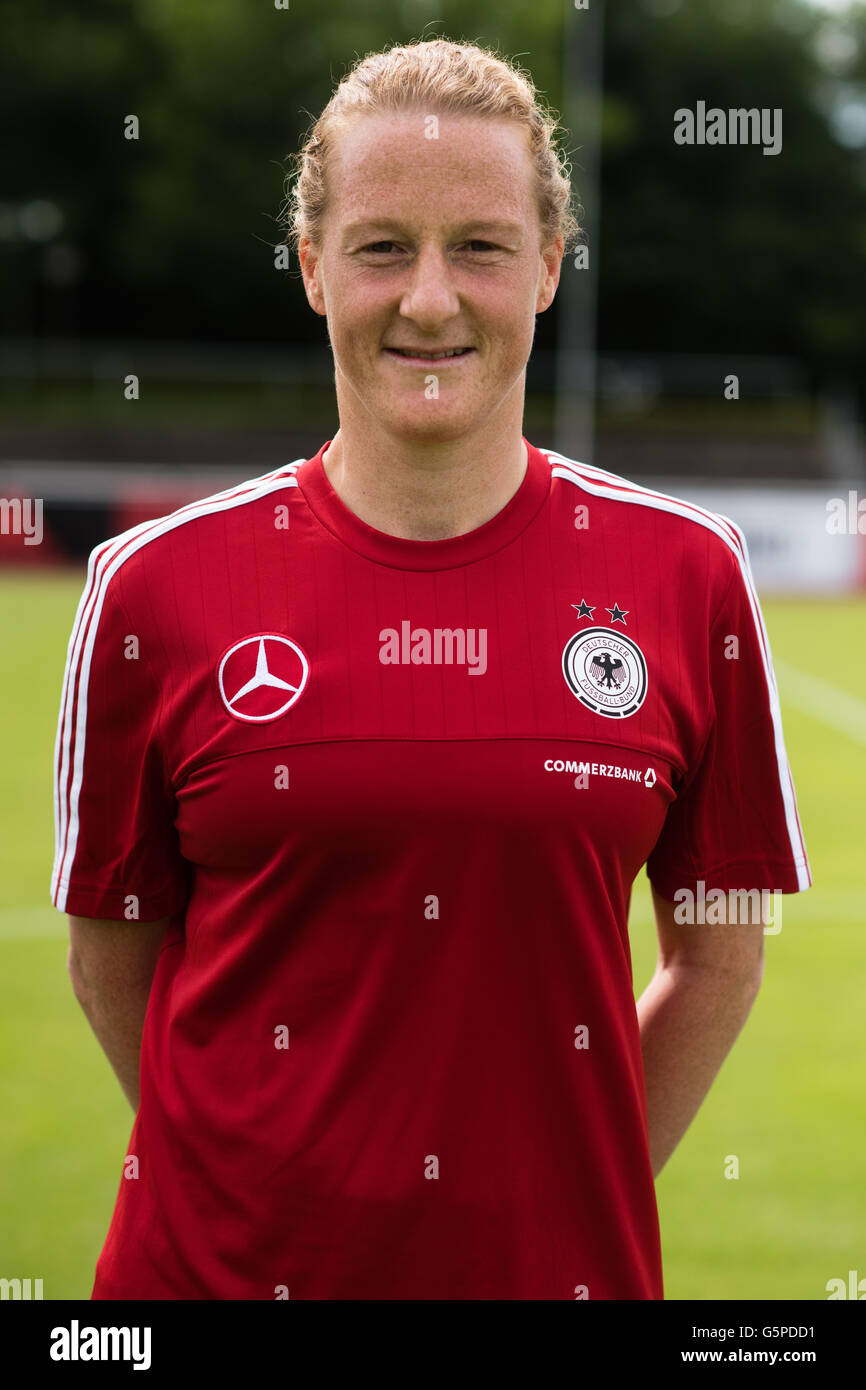Middle fielder Melanie Behringer poses at a photocall of the German ...