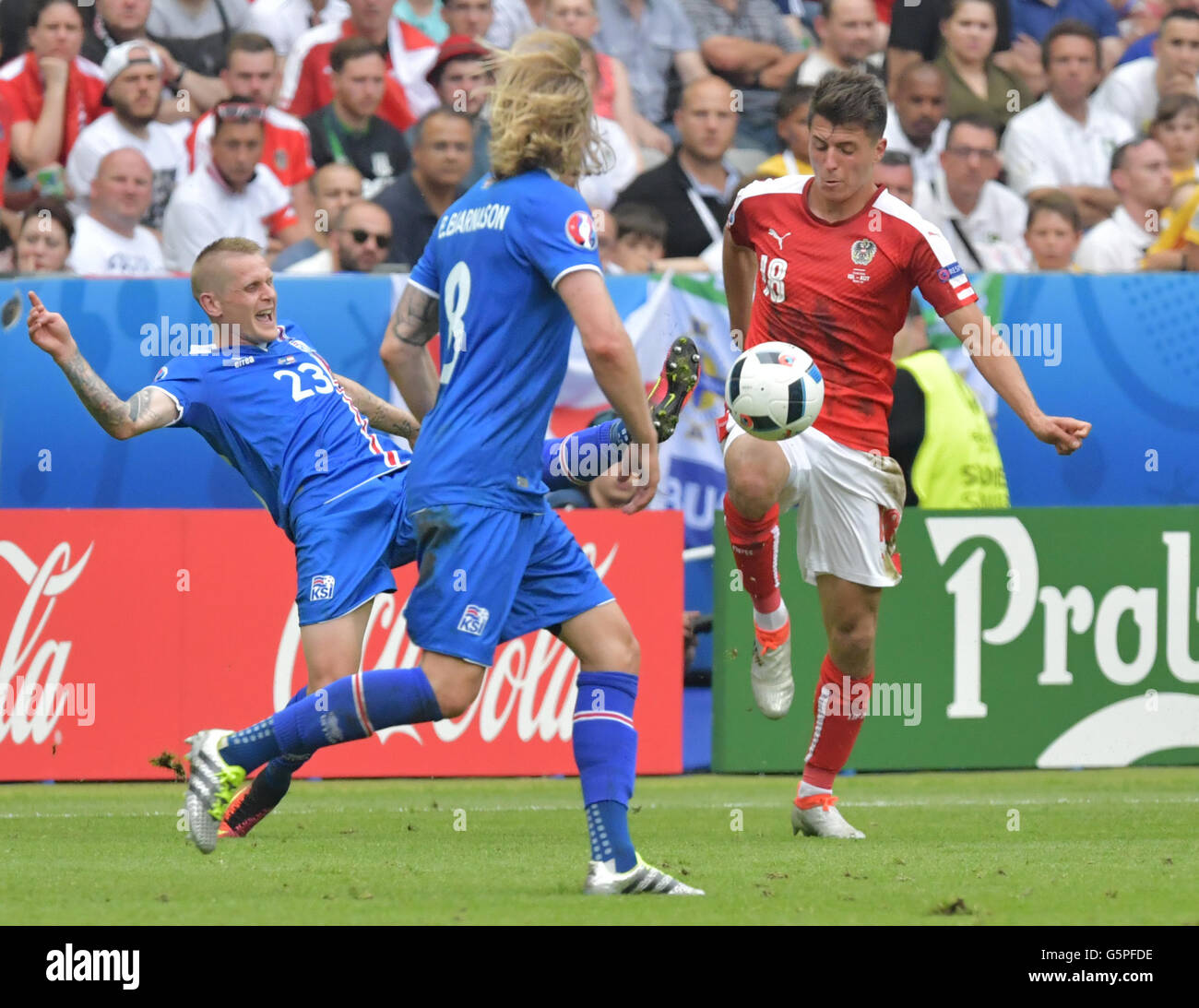 Iceland's Ari Freyr Skulason and Birkir Bjarnason vies for the ball ...