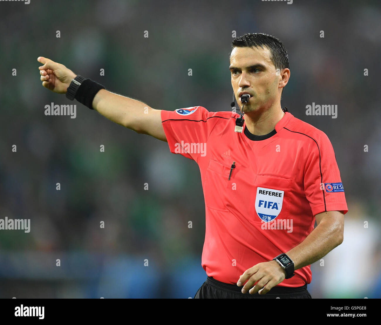 Romanian referee Ovidiu Hategan gestures during the preliminary round ...