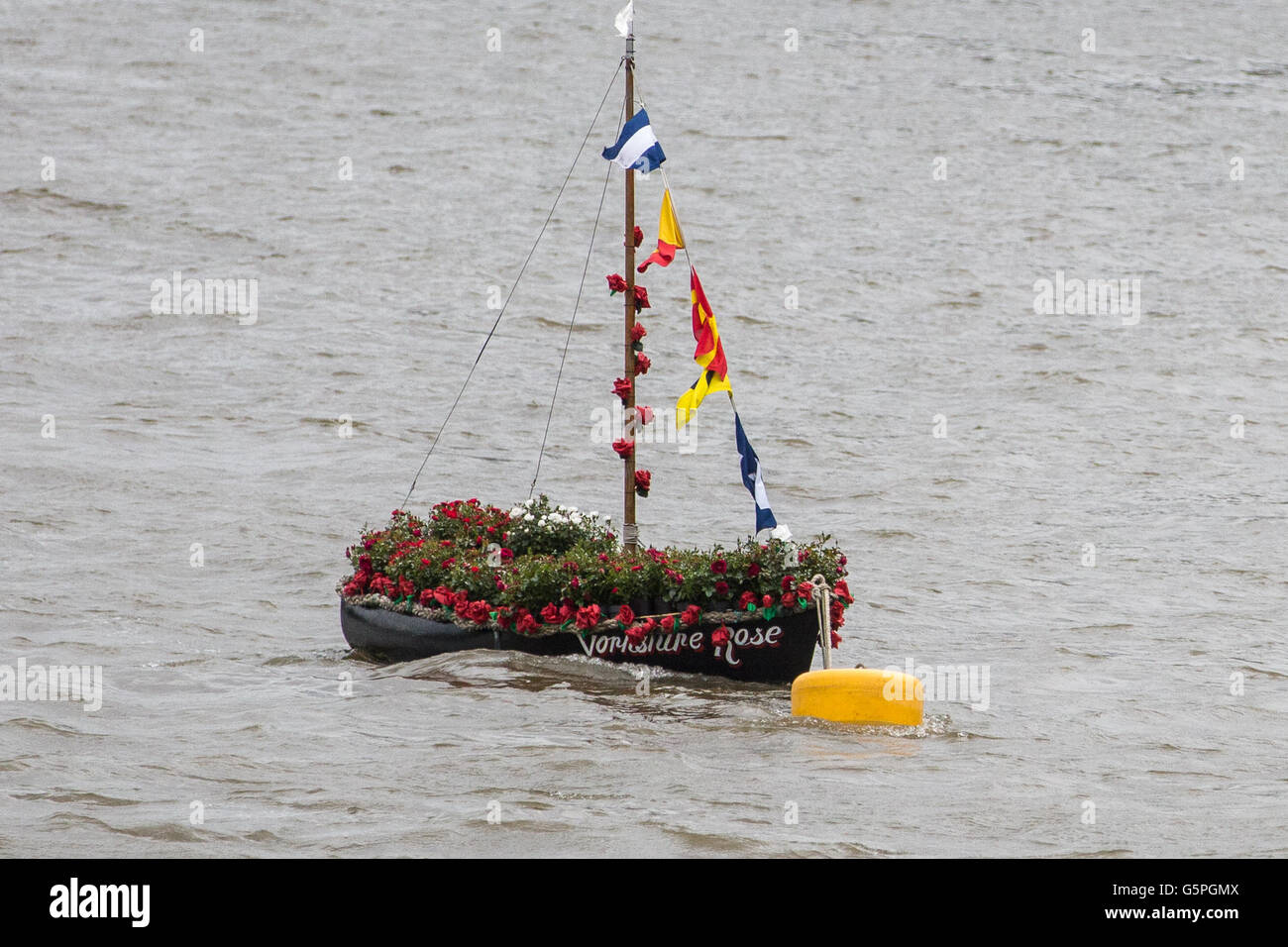 London, UK. 22nd June, 2016. A boat covered in roses and bearing the ...