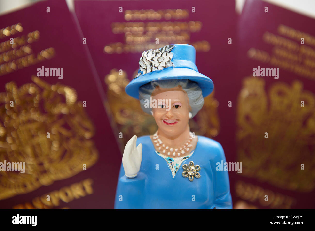 A miniature toy model of Queen Elizabeth II and a British European ...