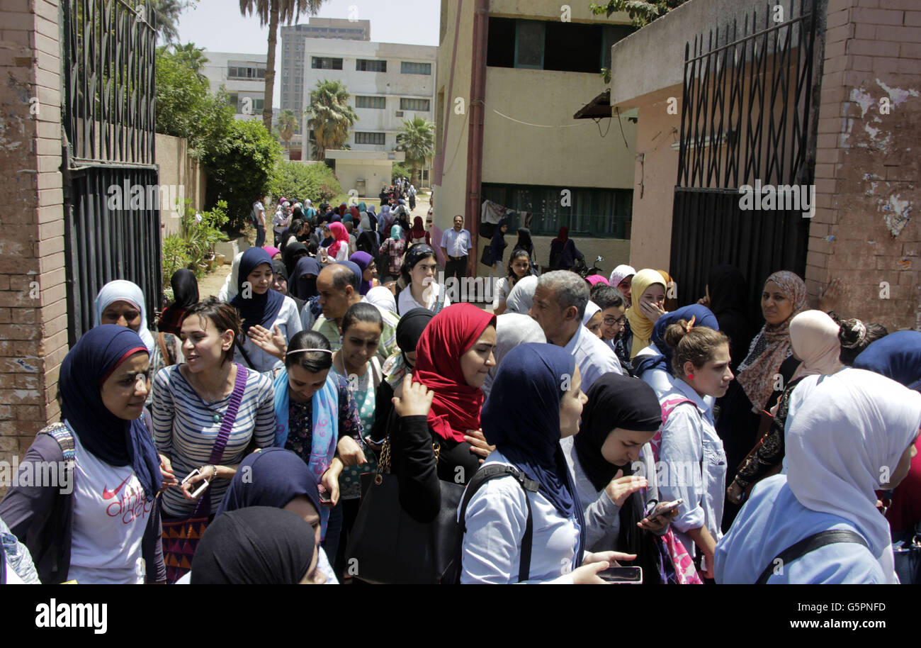 Cairo, Egypt. 23rd June, 2016. Egyptian students walk outside their ...