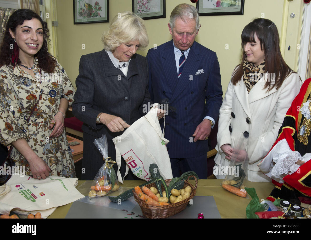 The Prince of Wales and The Duchess of Cornwall with volunteers Sarah ...