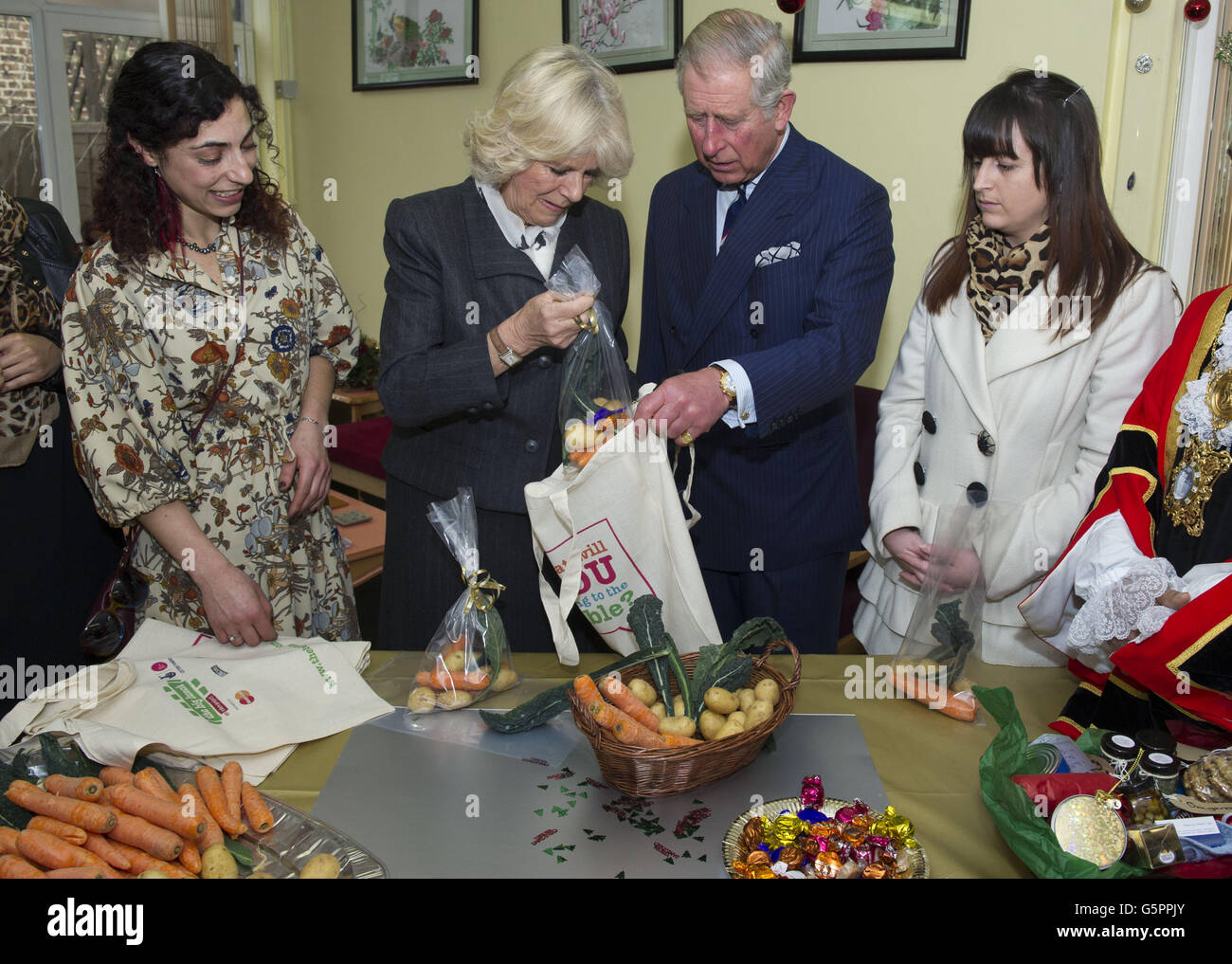 The Prince of Wales and The Duchess of Cornwall with volunteers Sarah ...