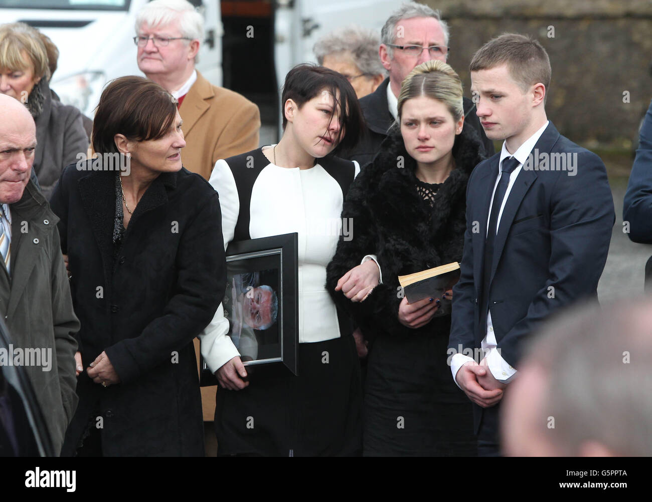 Wife Maire and children Nessa, Suin and Padraig Og attend the funeral ...