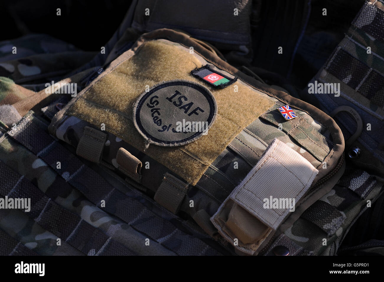 General view of an ISAF badge on British Army kit in Camp Bastion ...