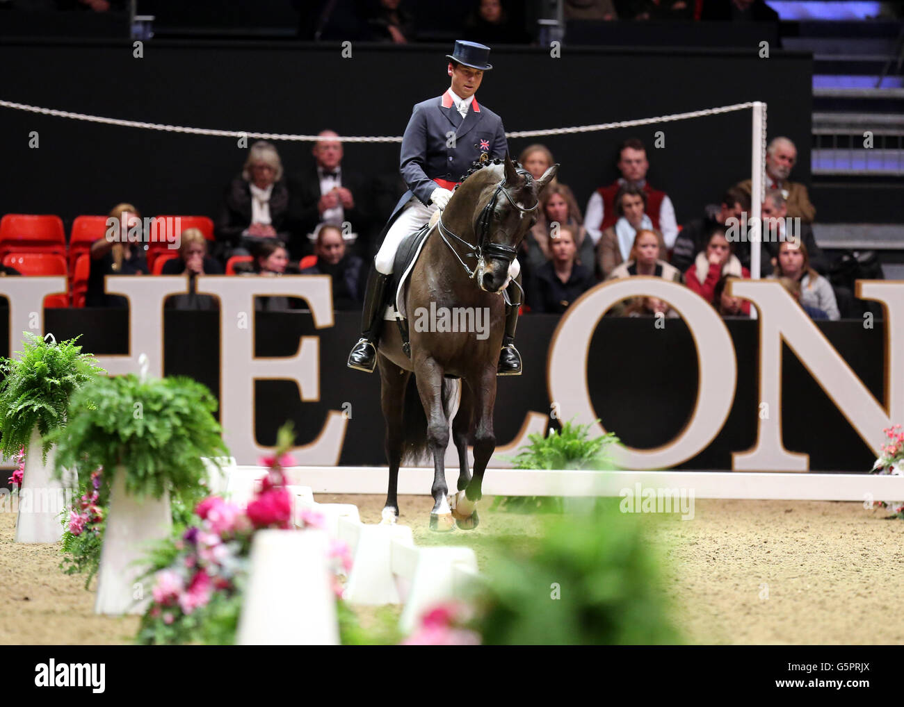 Great Britain's Carl Hester rides Uthopia in the Reem Acra FEI World ...