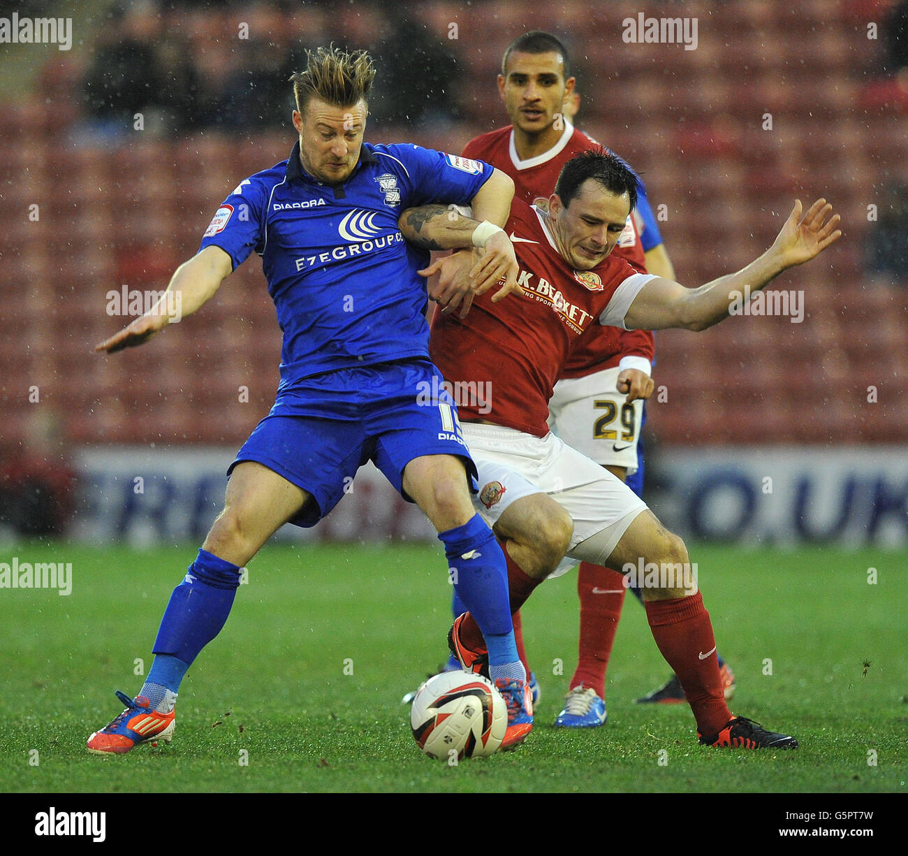 Birmingham City's Wade Elliott and Barnsley's Chris Dagnall during the ...