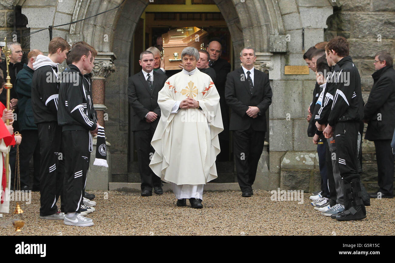 Mourners carry coffin at the funeral of Ian McKeever at the Church of ...