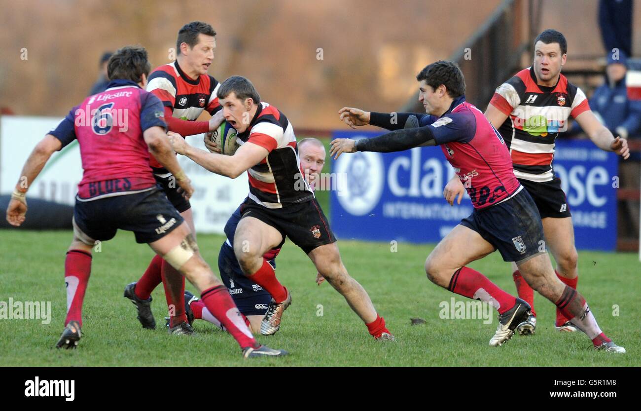 Stirling County's Colin Hutton gets tackled by Bedford's Gregor ...