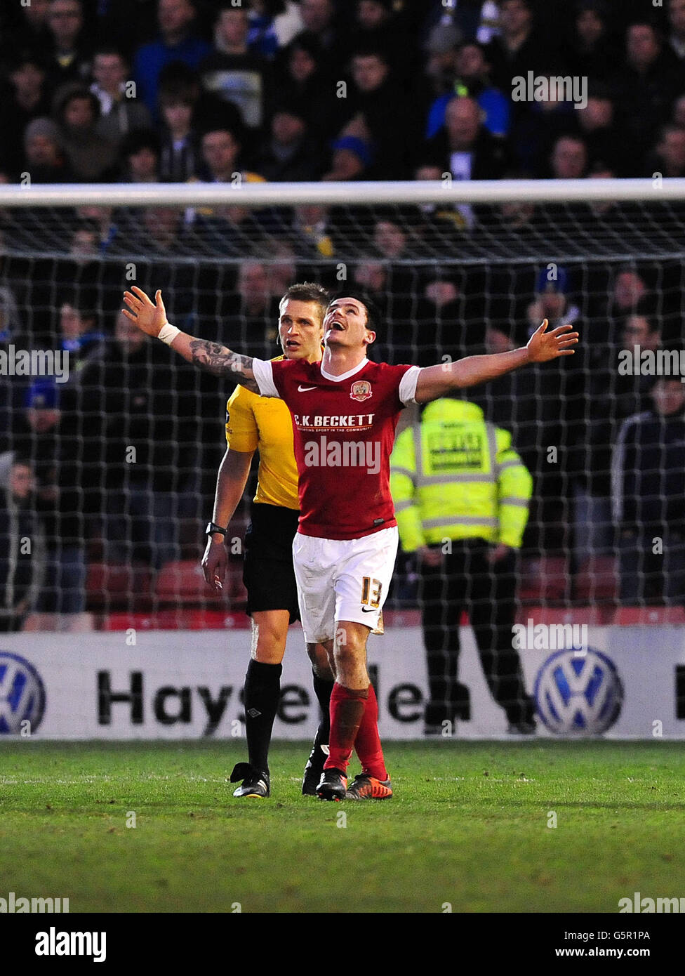 Barnsley's Chris Dagnall (centre) celebrates after scoring his side's ...